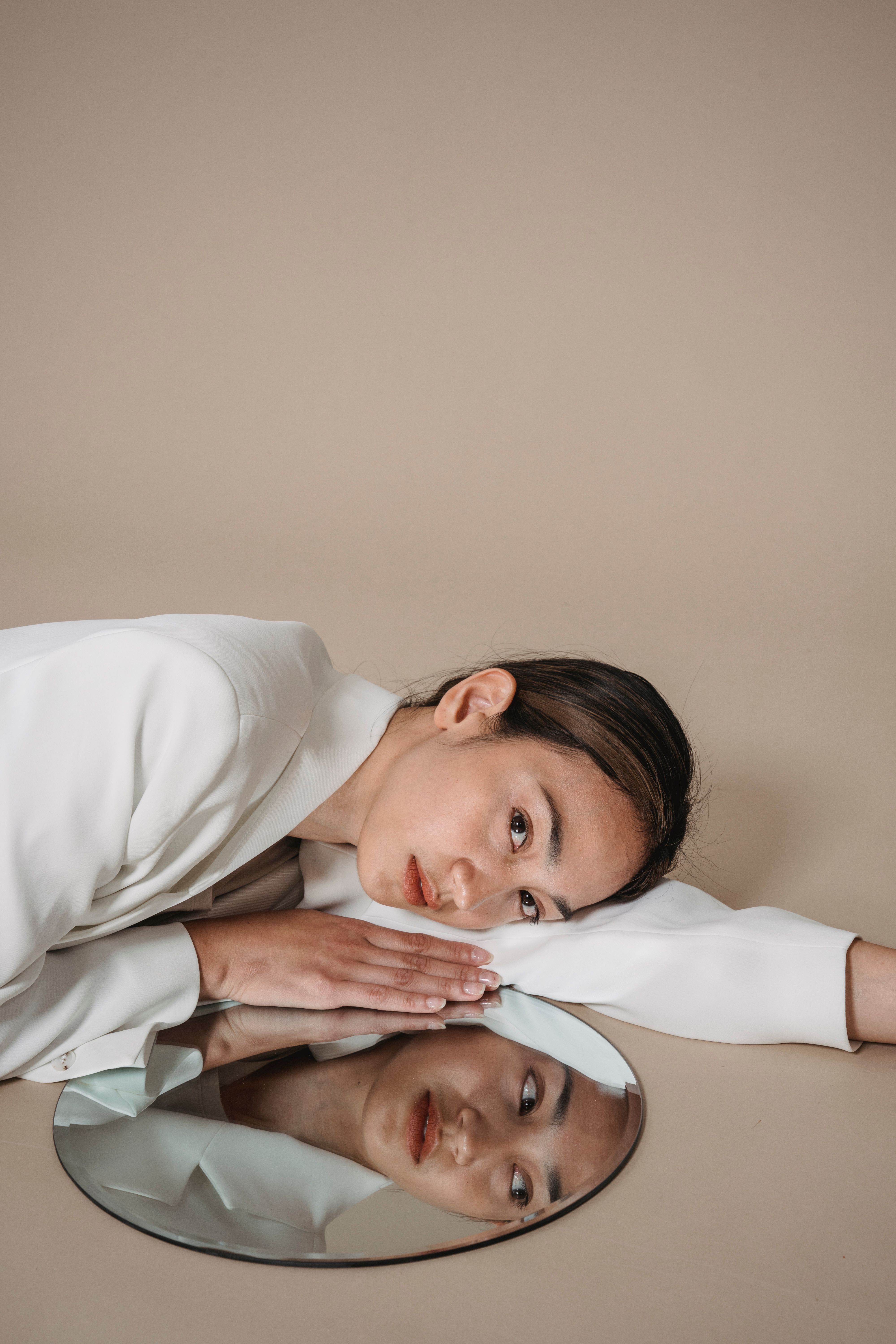 A Woman Lying on the Floor · Free Stock Photo