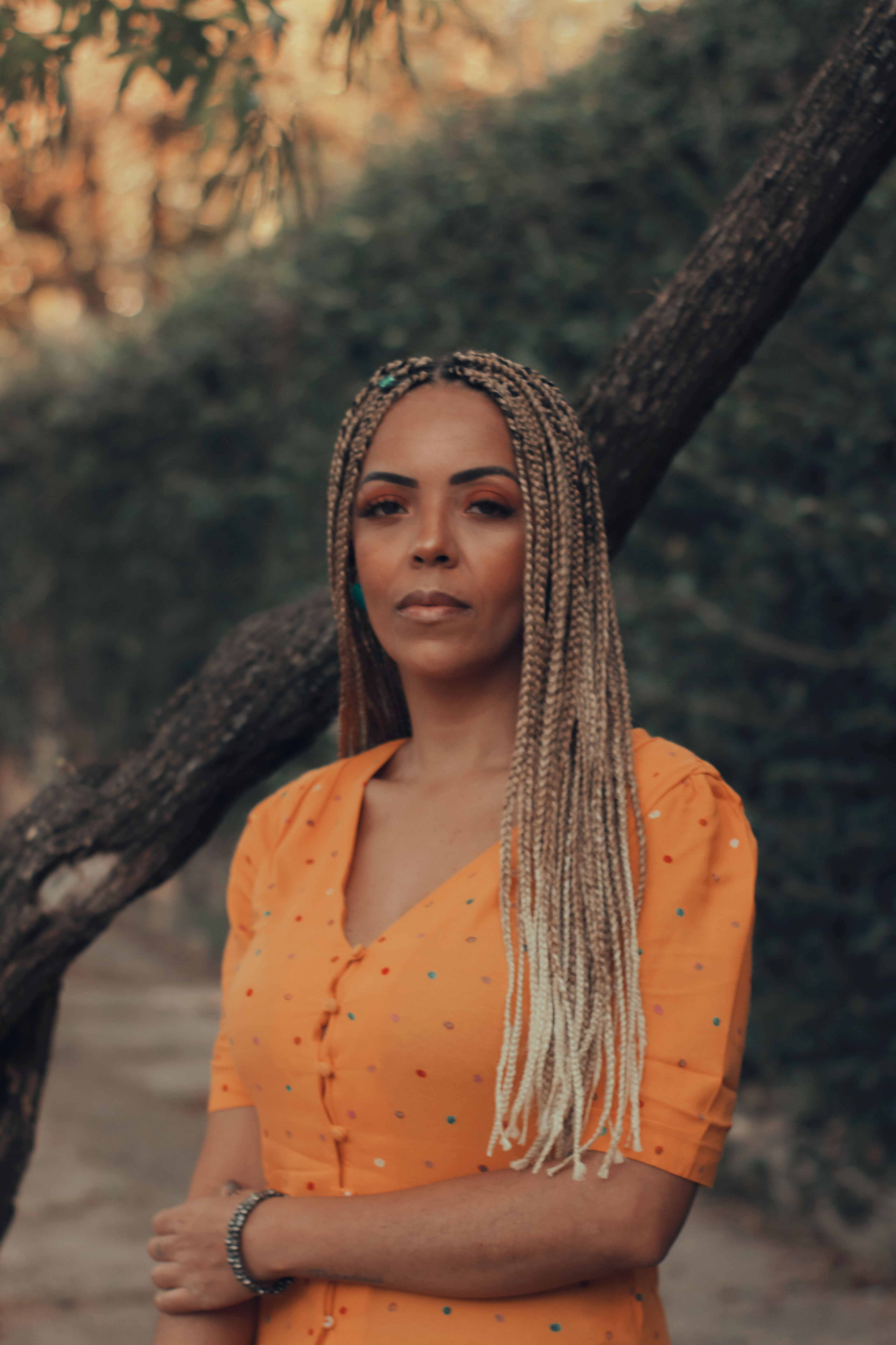 Beautiful Woman Wearing Orange Top · Free Stock Photo