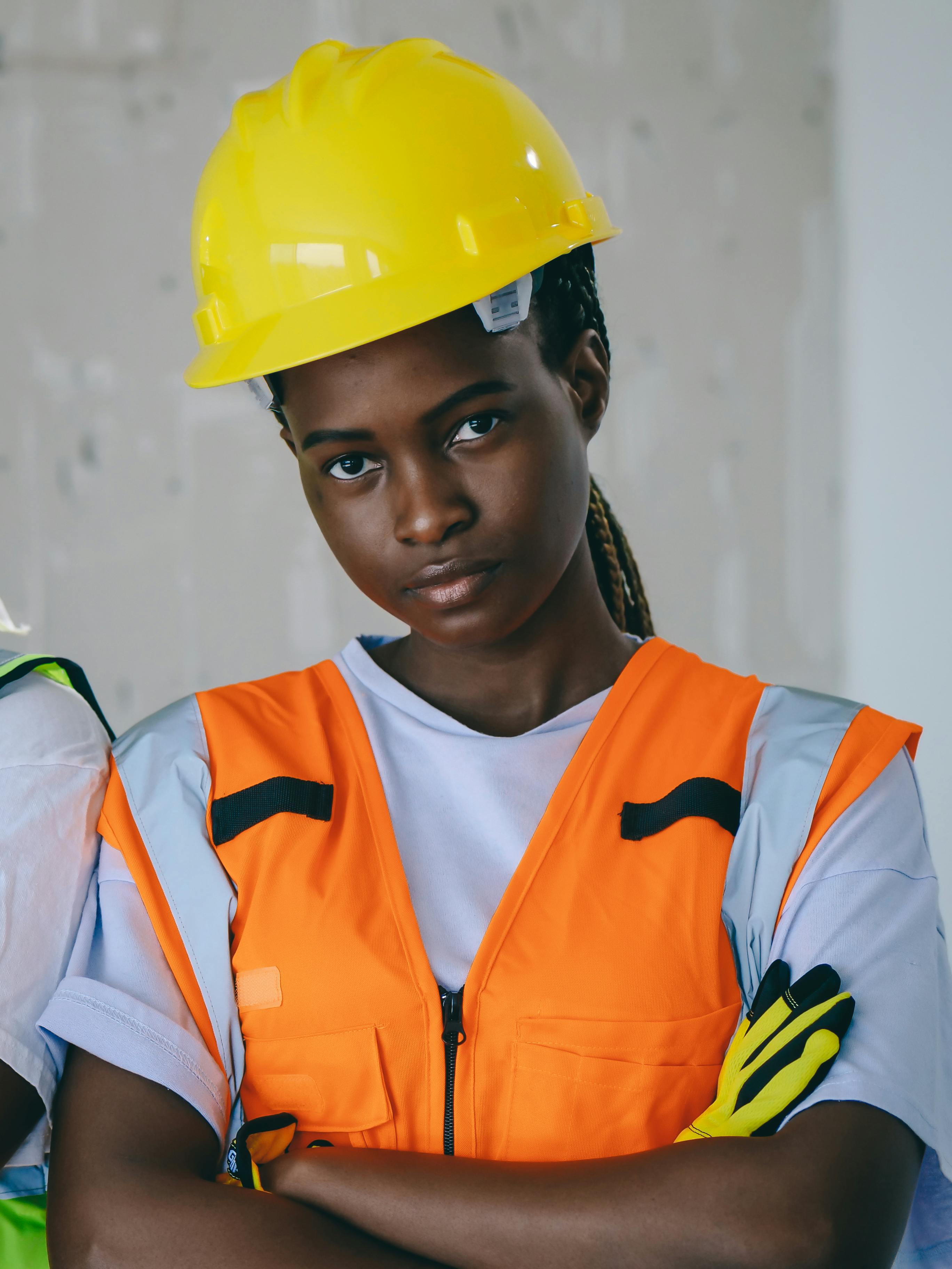 Handywoman Holding a Hammer · Free Stock Photo