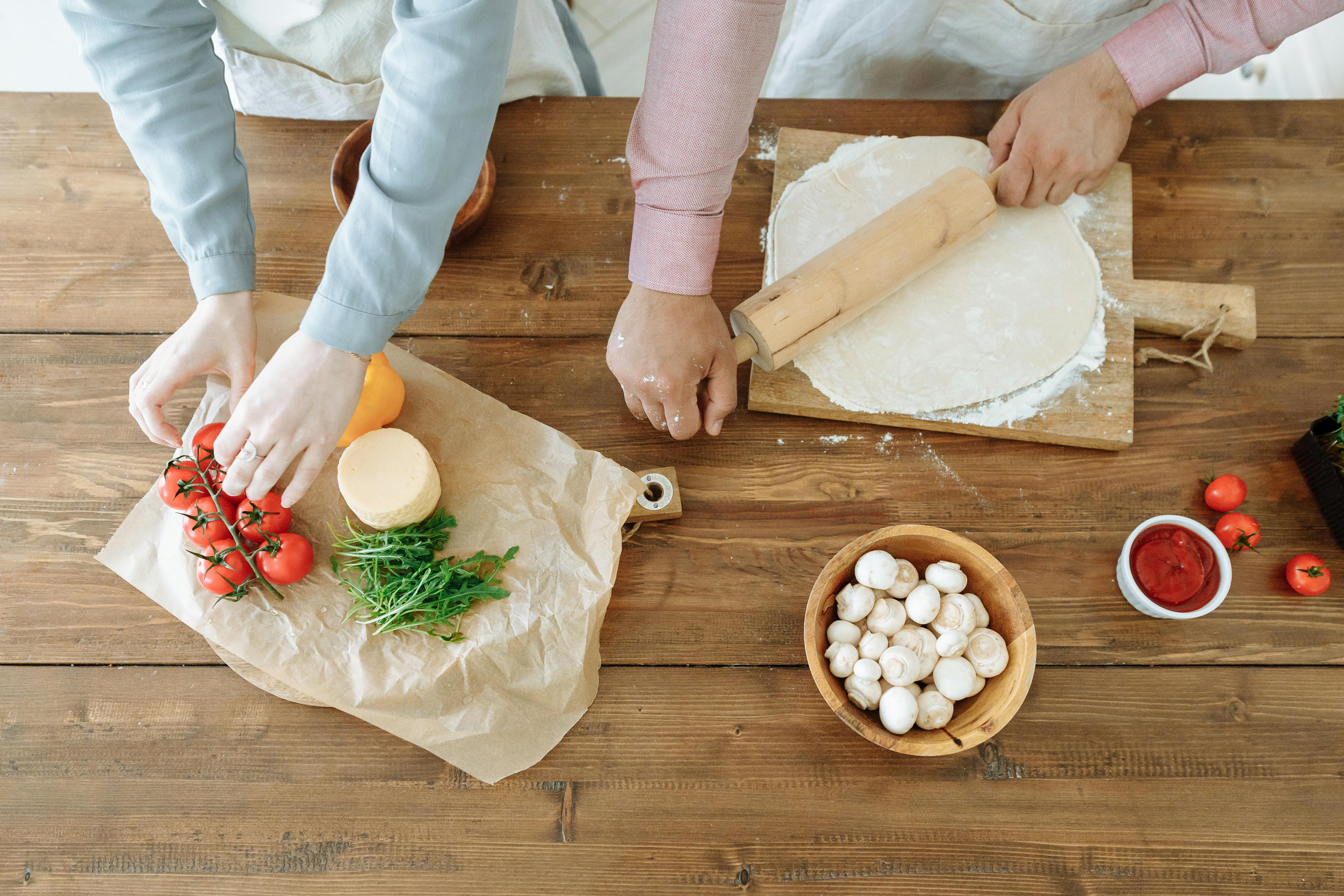 Couple Making Pizza · Free Stock Photo