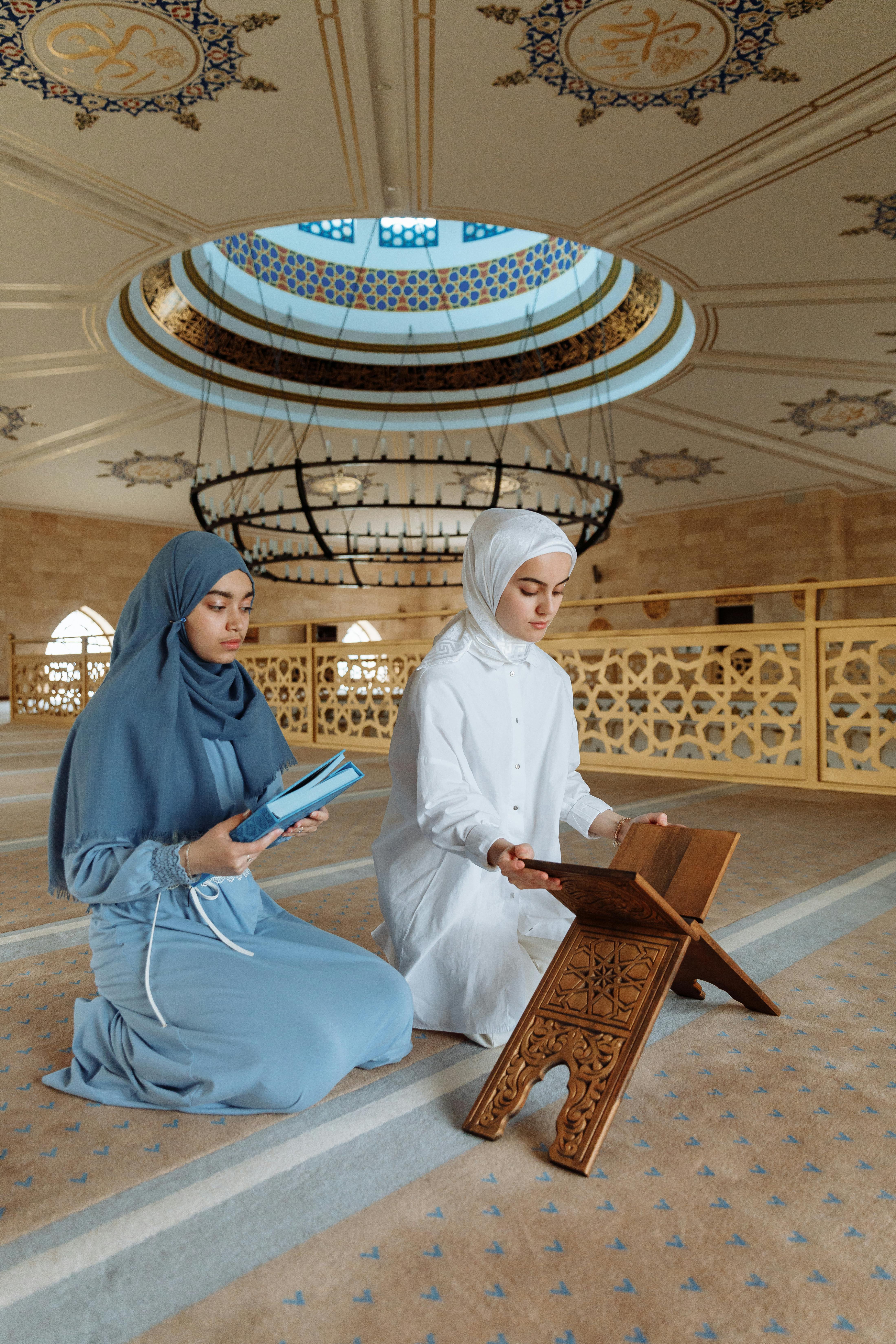 Two Women Praying Together · Free Stock Photo