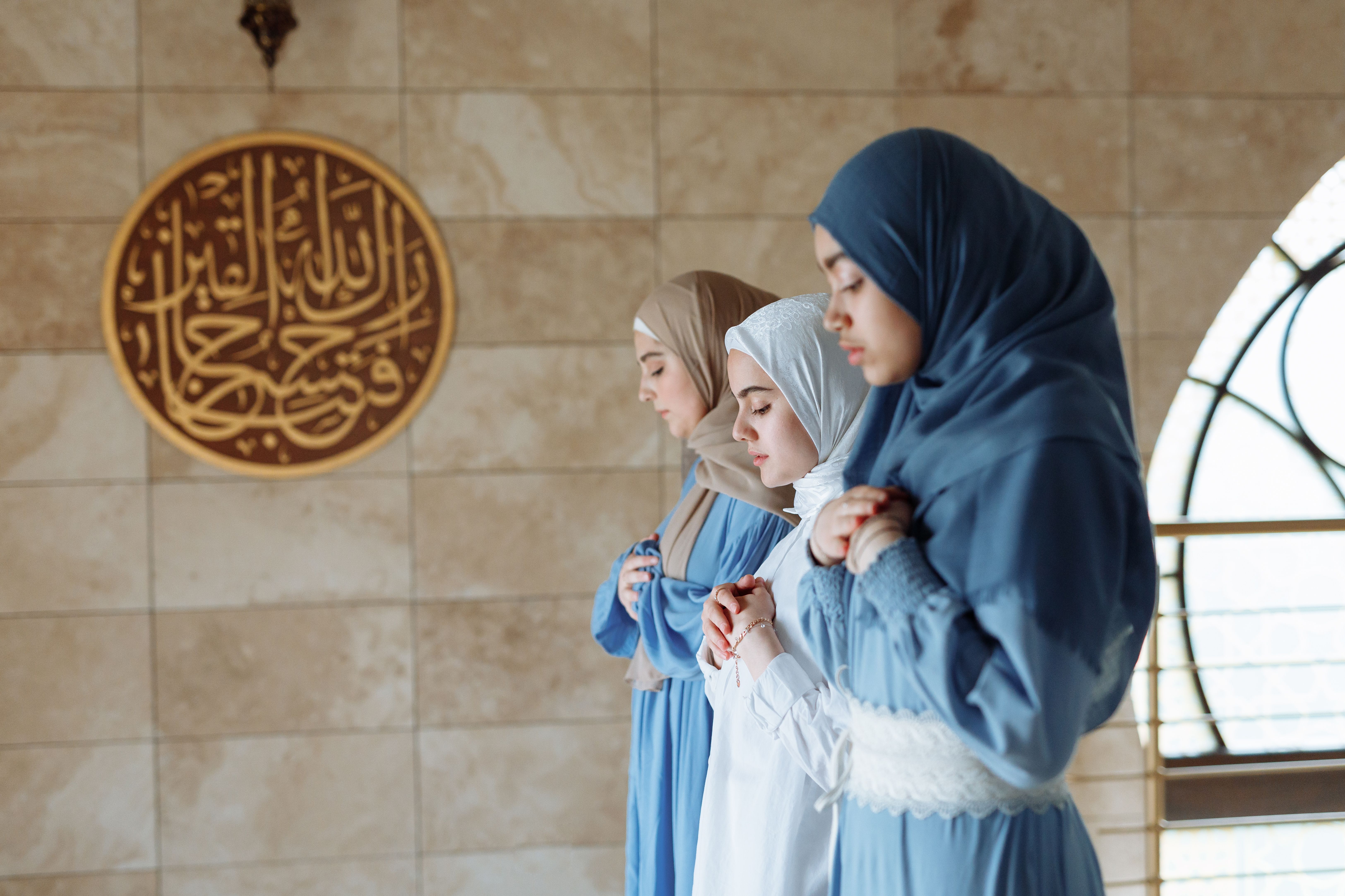 Woman in Traditional Clothing Praying · Free Stock Photo