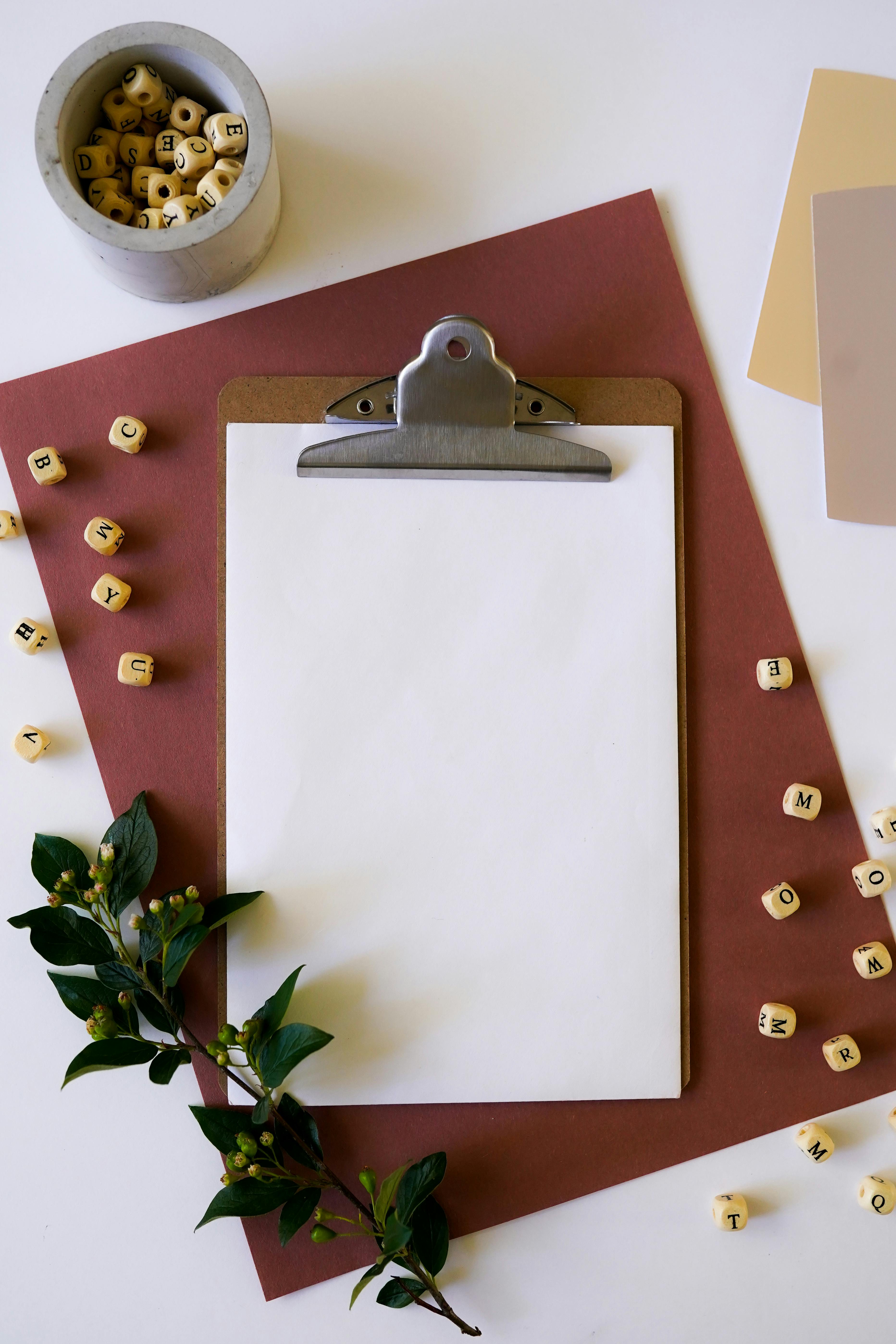 White Printer Paper on Clipboard · Free Stock Photo
