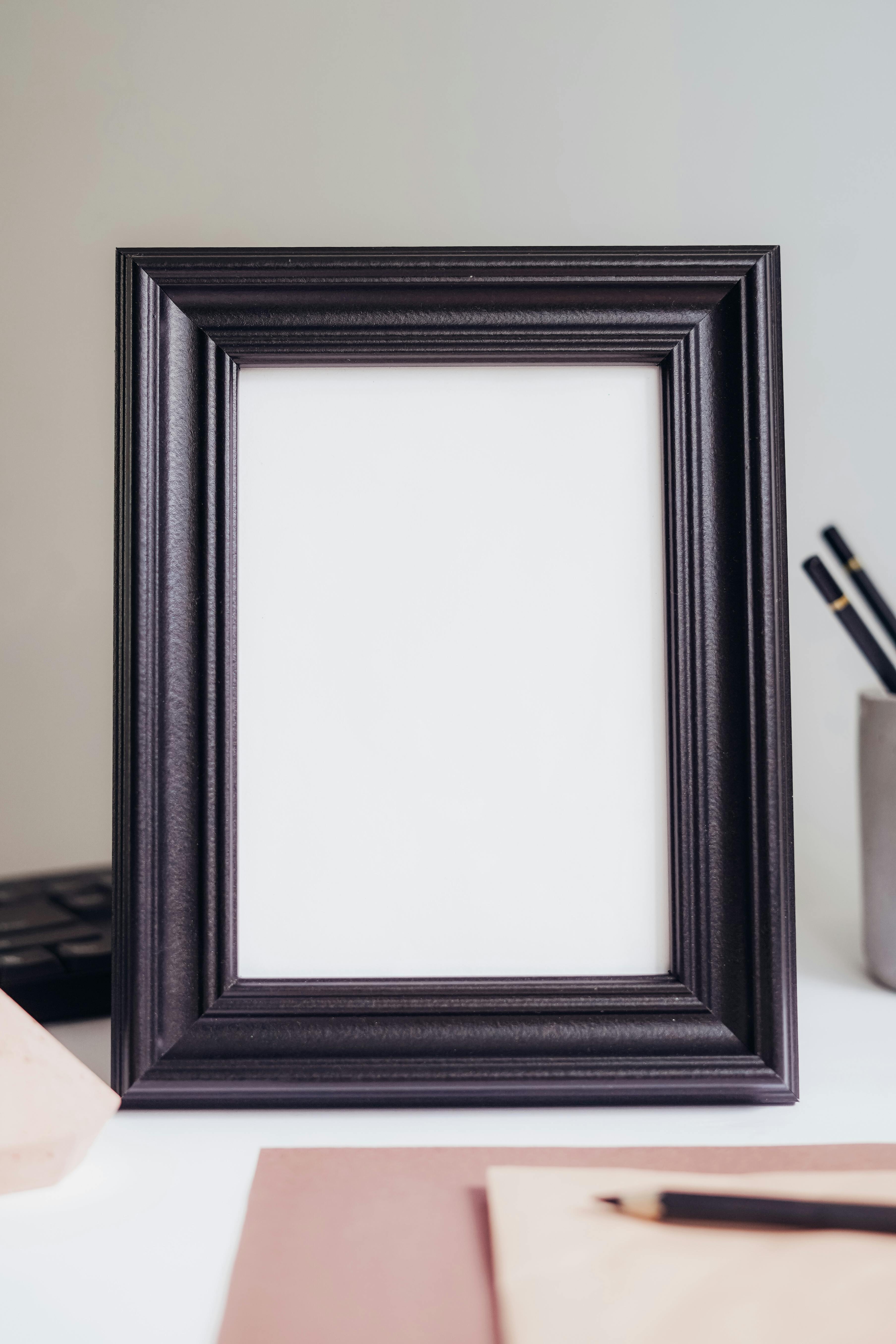 A Picture Frame on a Chair · Free Stock Photo