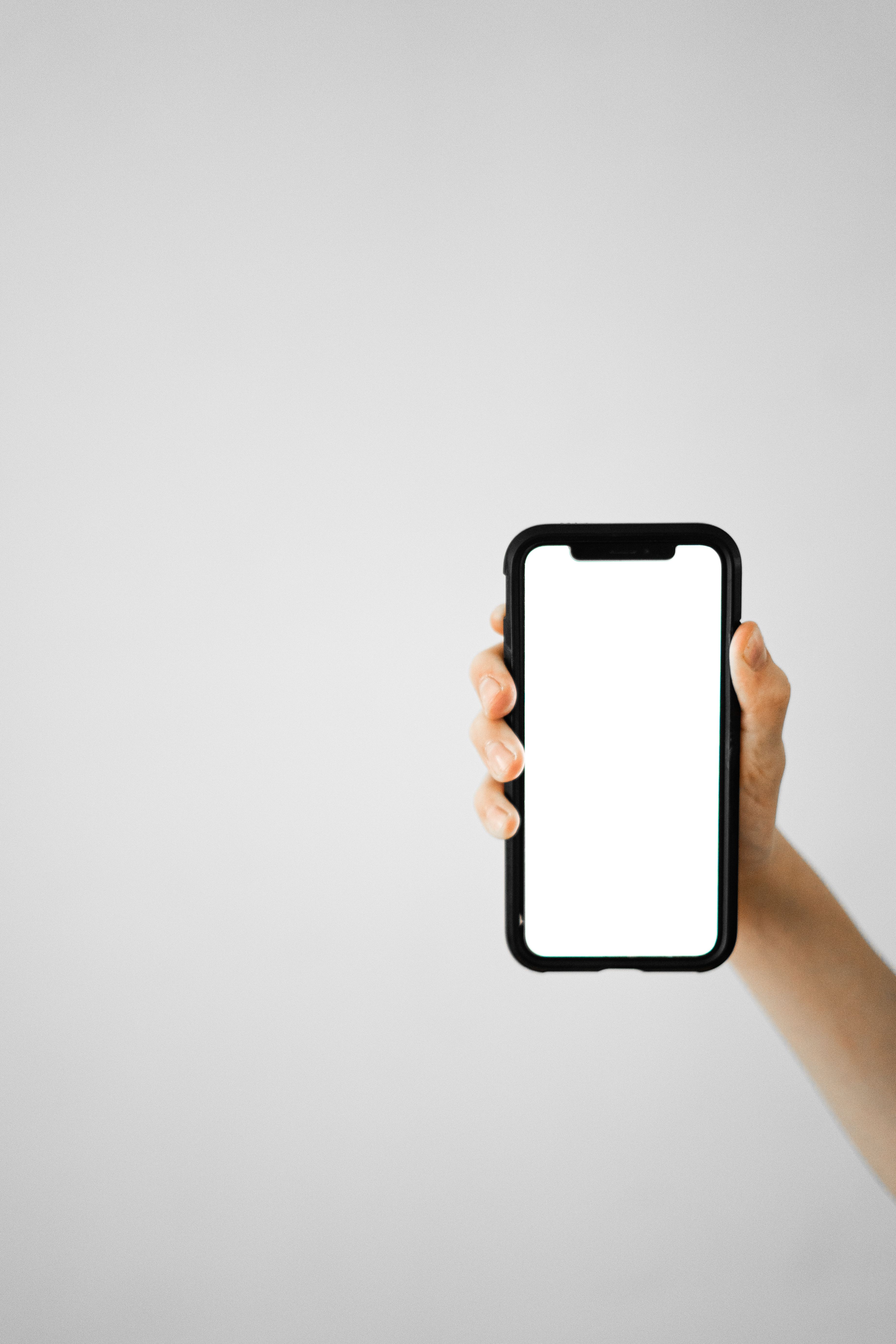 Smartphone Leaning on a Rock · Free Stock Photo