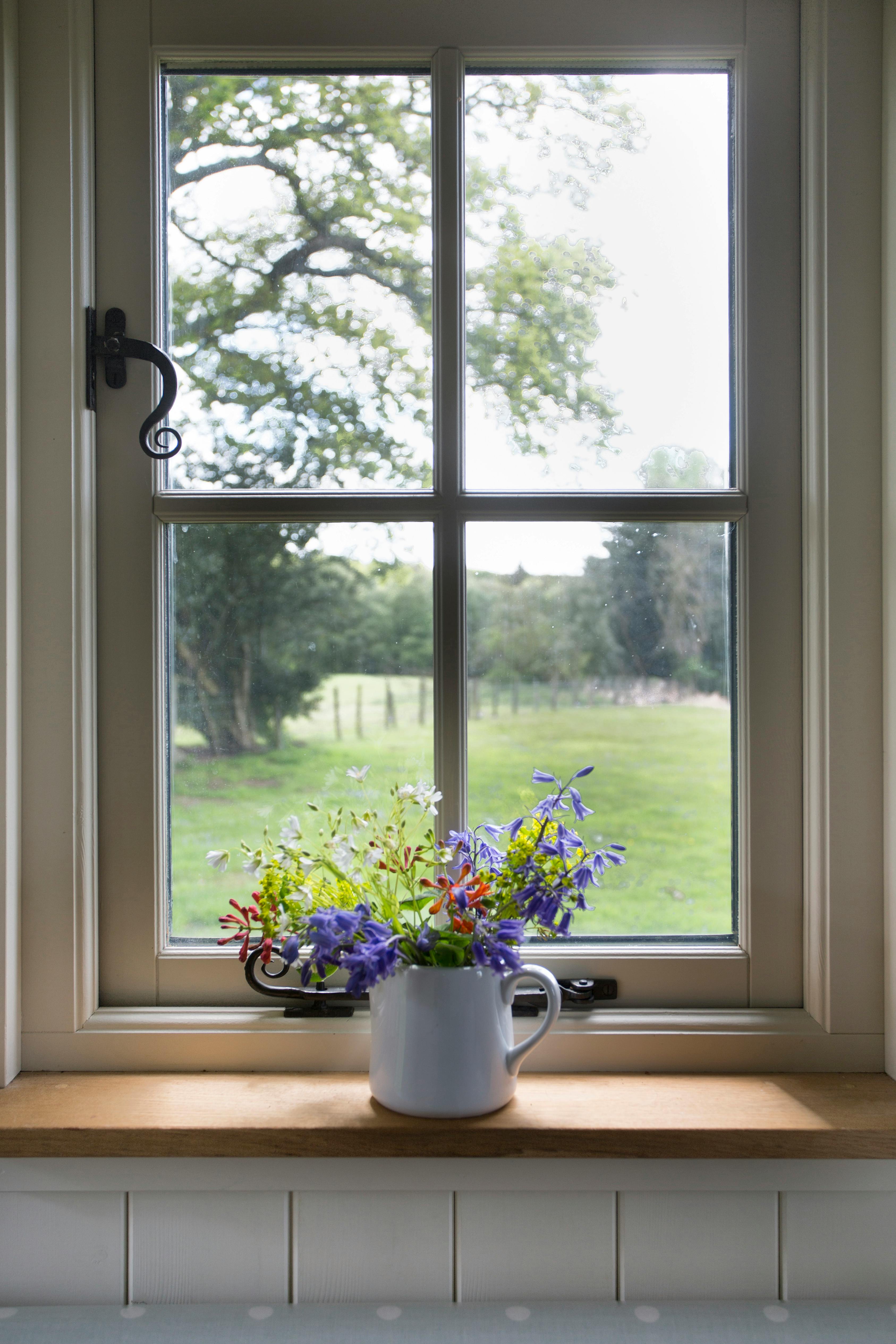White Ceramic Vase With Flowers Near Window · Free Stock Photo
