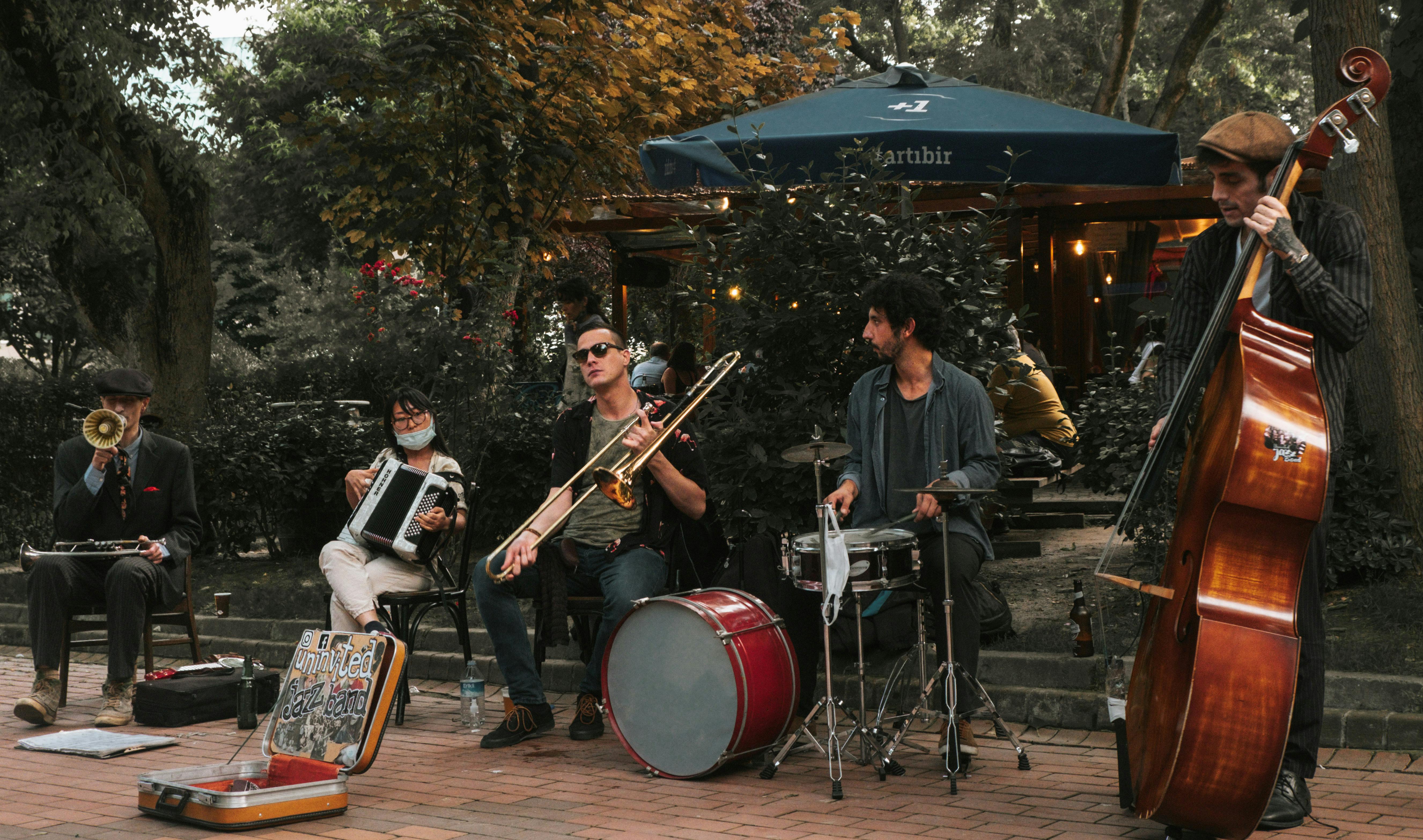A People Playing Music at the Street · Free Stock Photo