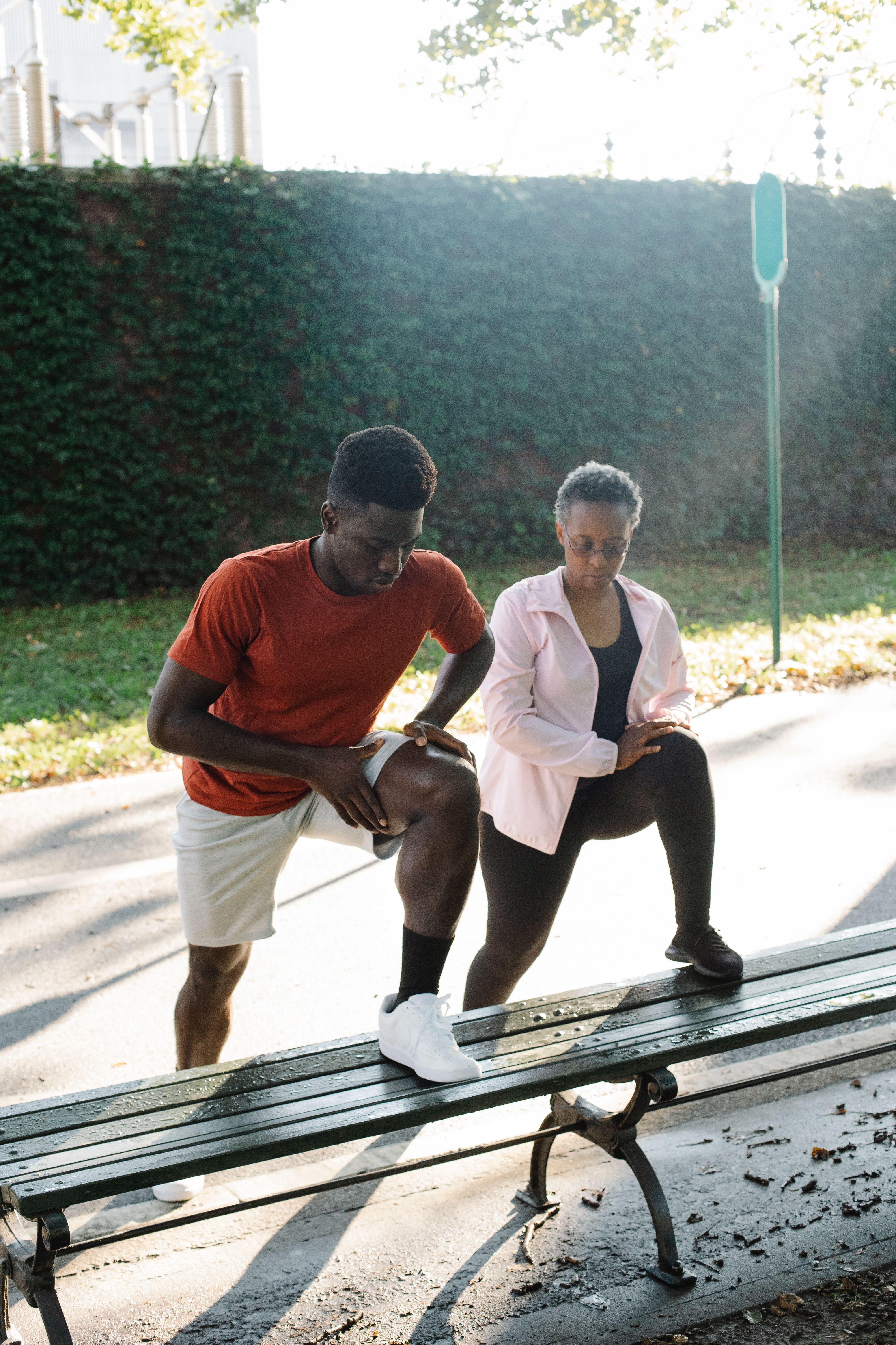 Man and Woman Exercising Together · Free Stock Photo