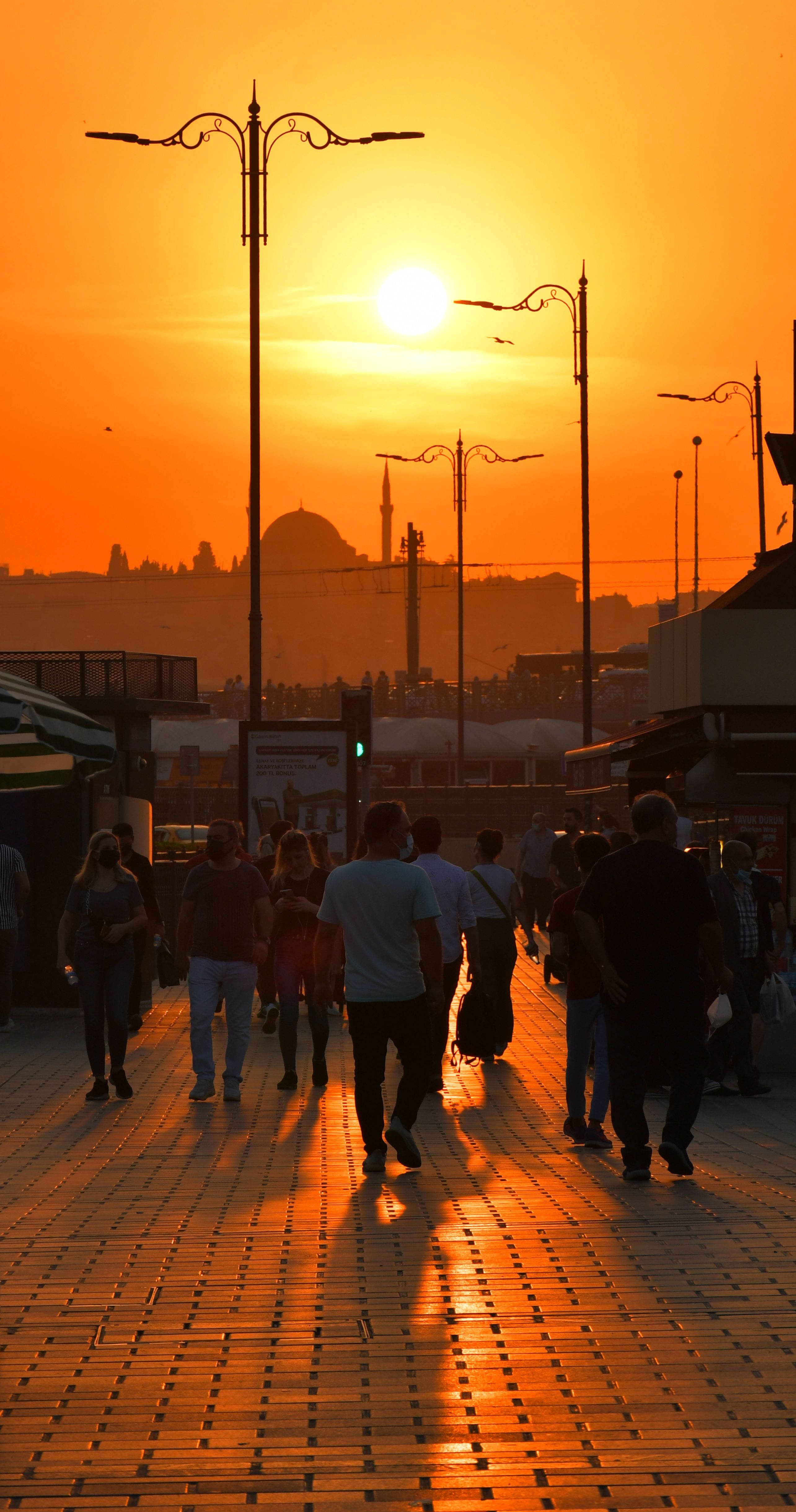 People Walking on the Street during Sunset · Free Stock Photo