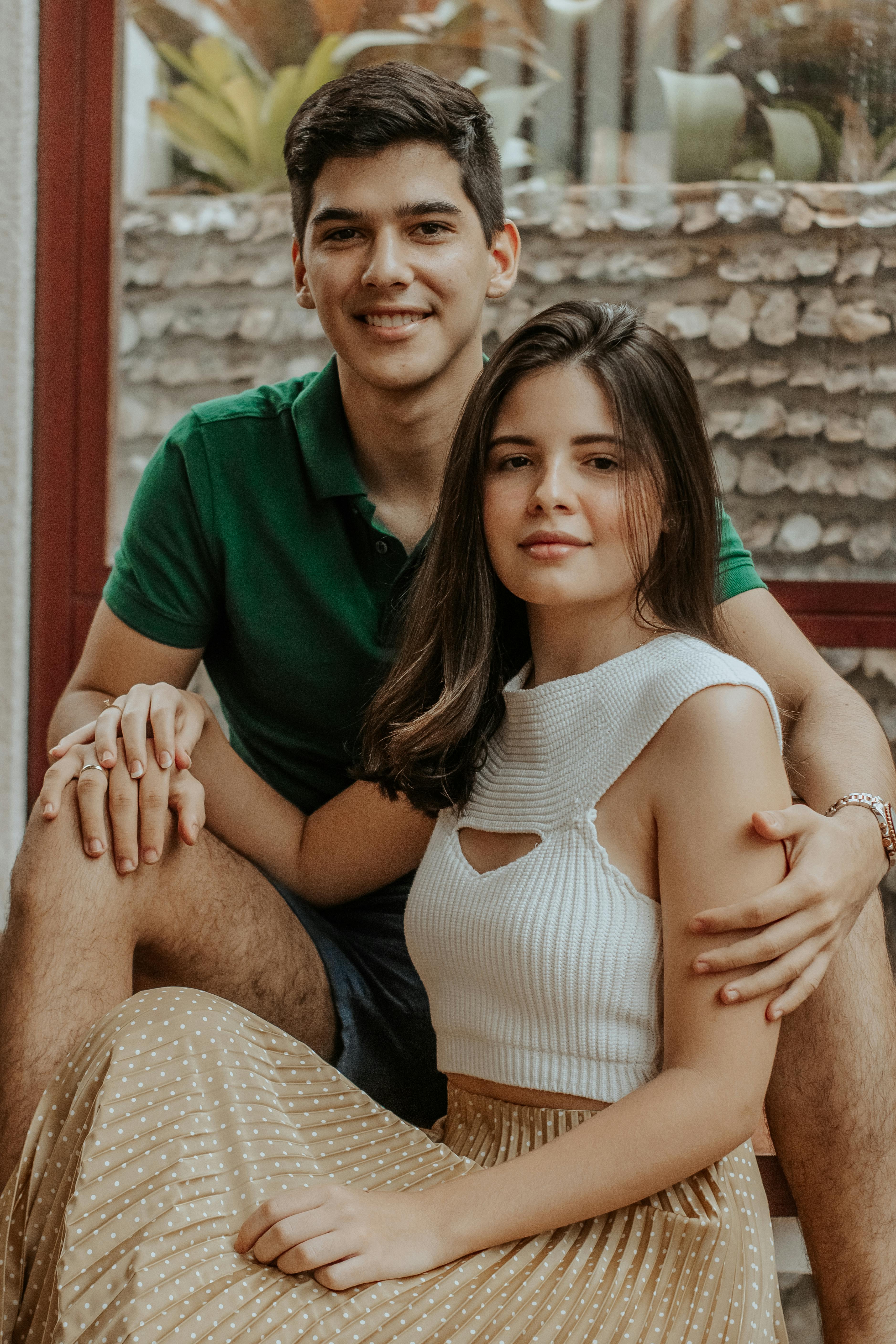 A Couple in Traditional Clothes Smiling · Free Stock Photo