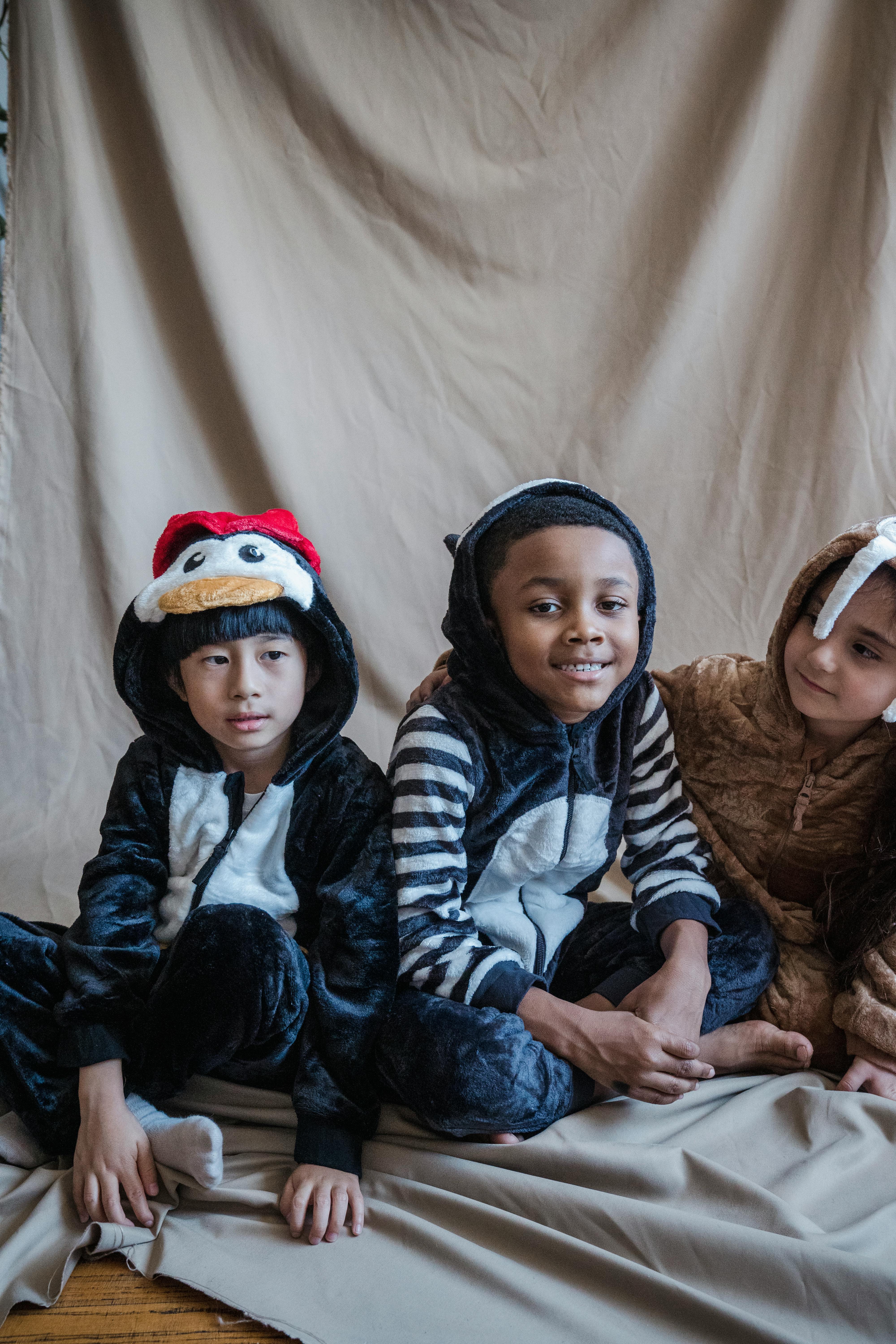 Adorable Kids Wearing their Onesie Animal Costumes · Free Stock Photo