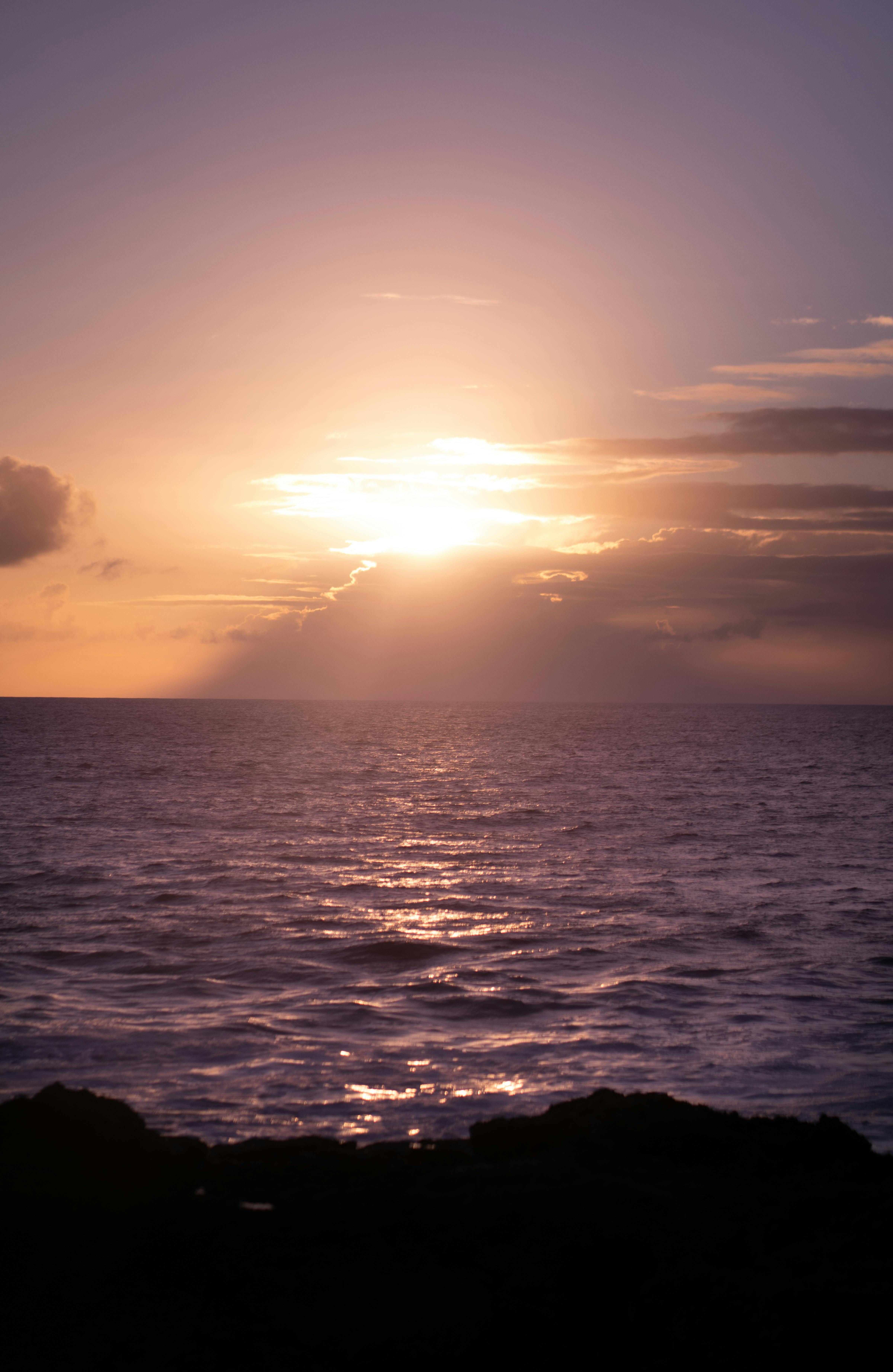 Ripples on Water in the Ocean during Sunset · Free Stock Photo