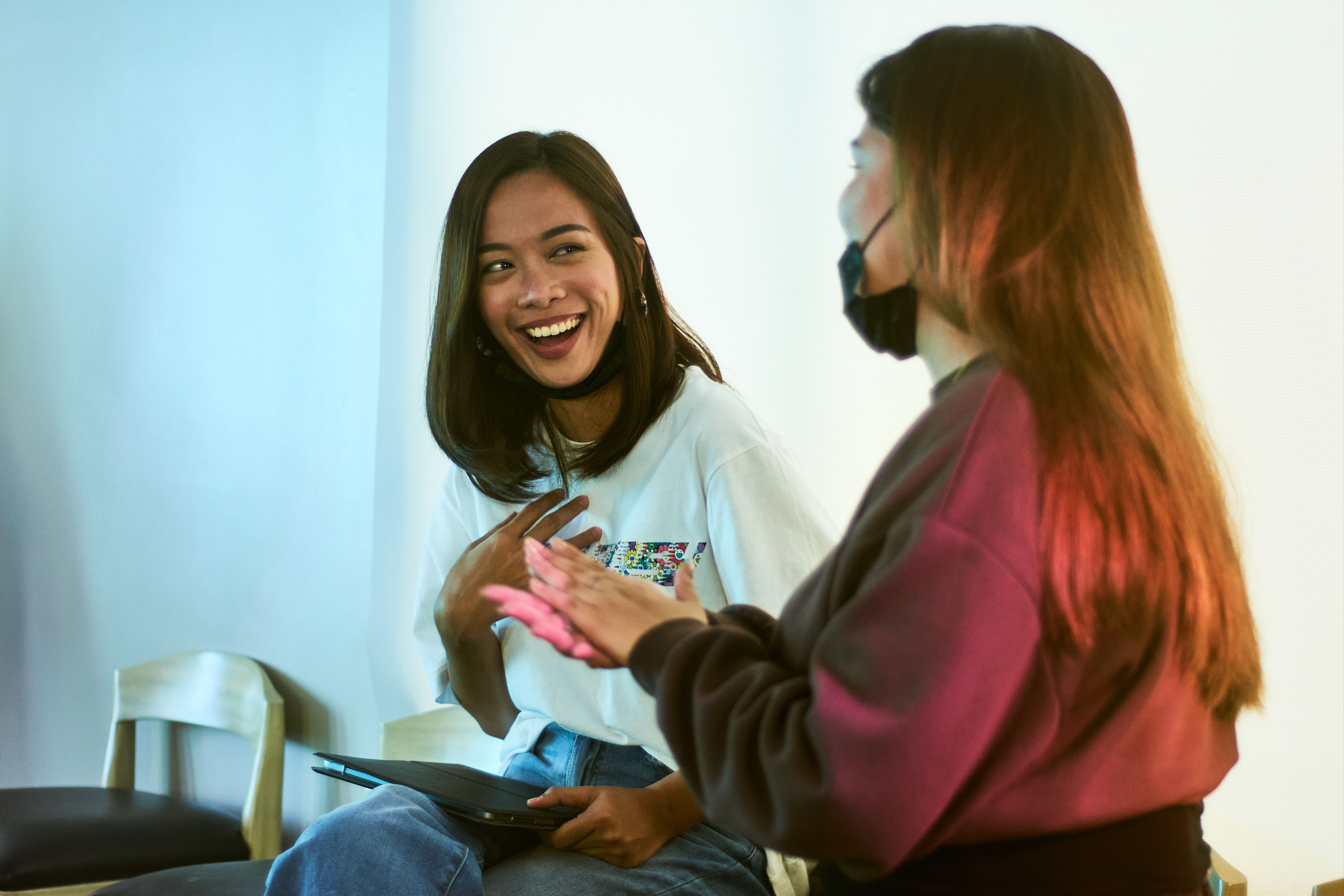 Photo of a Man Telling a Secret to a Woman · Free Stock Photo