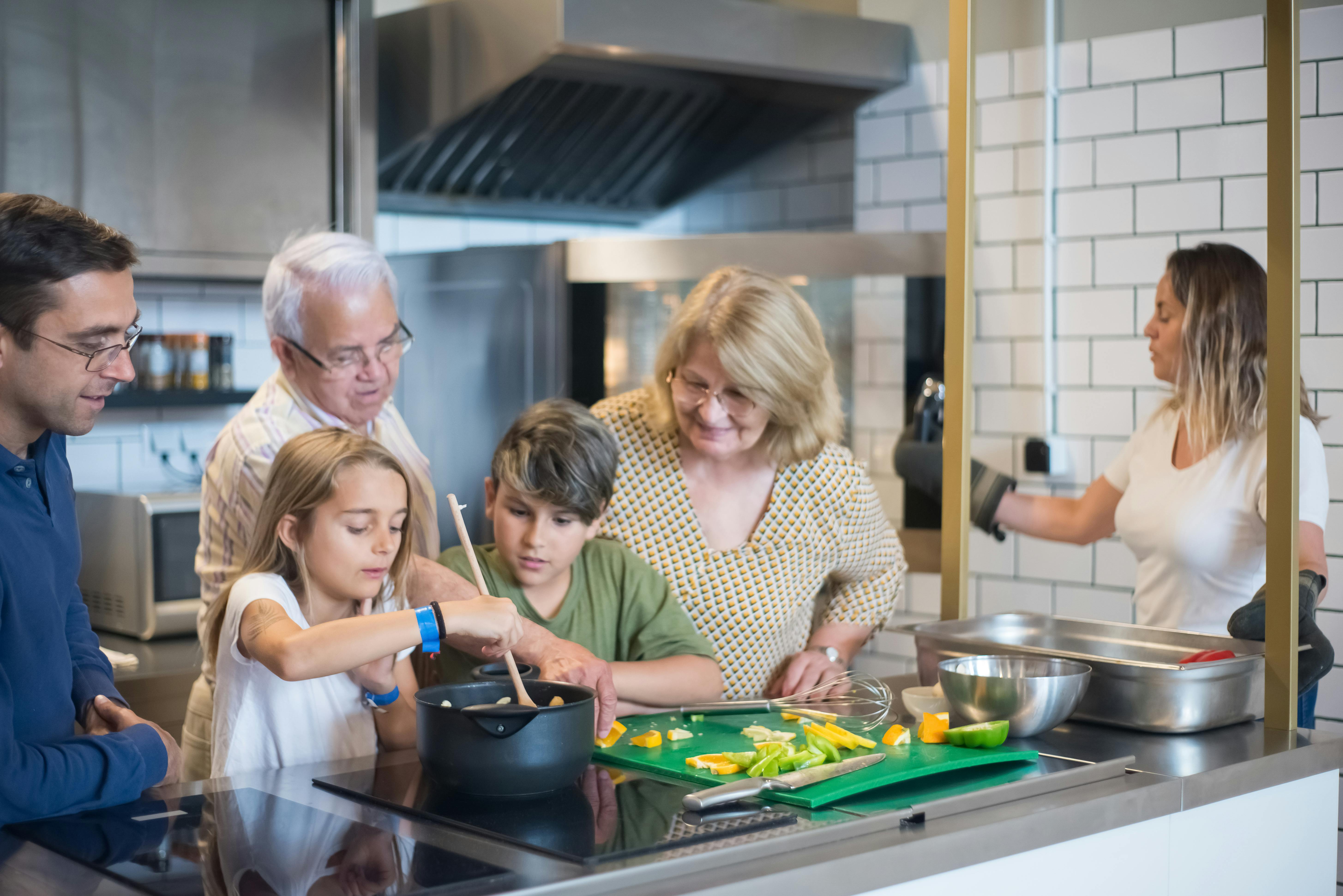 Siblings Learning How to Make Dumplings · Free Stock Photo