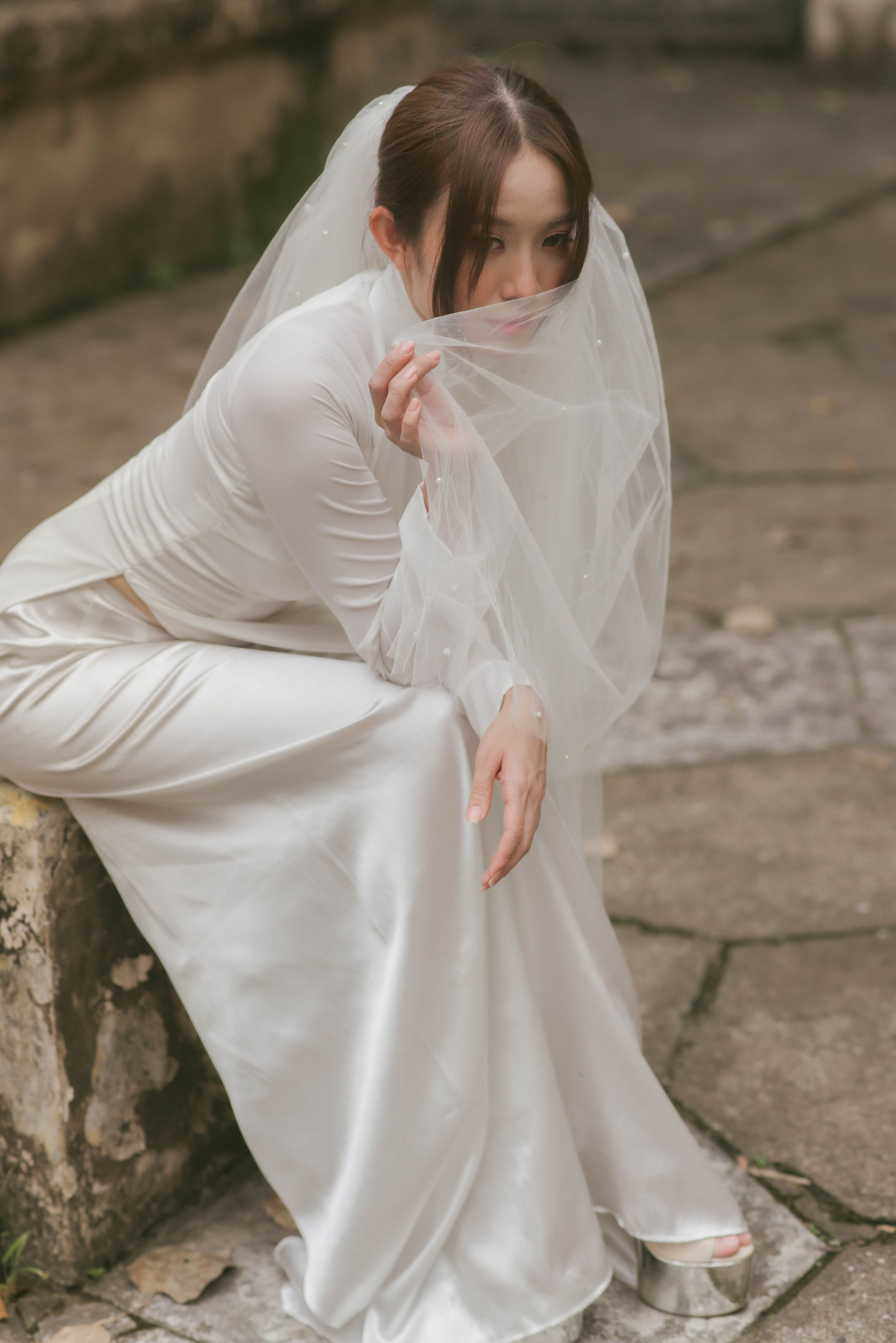 Woman in Wedding Dress Sitting · Free Stock Photo