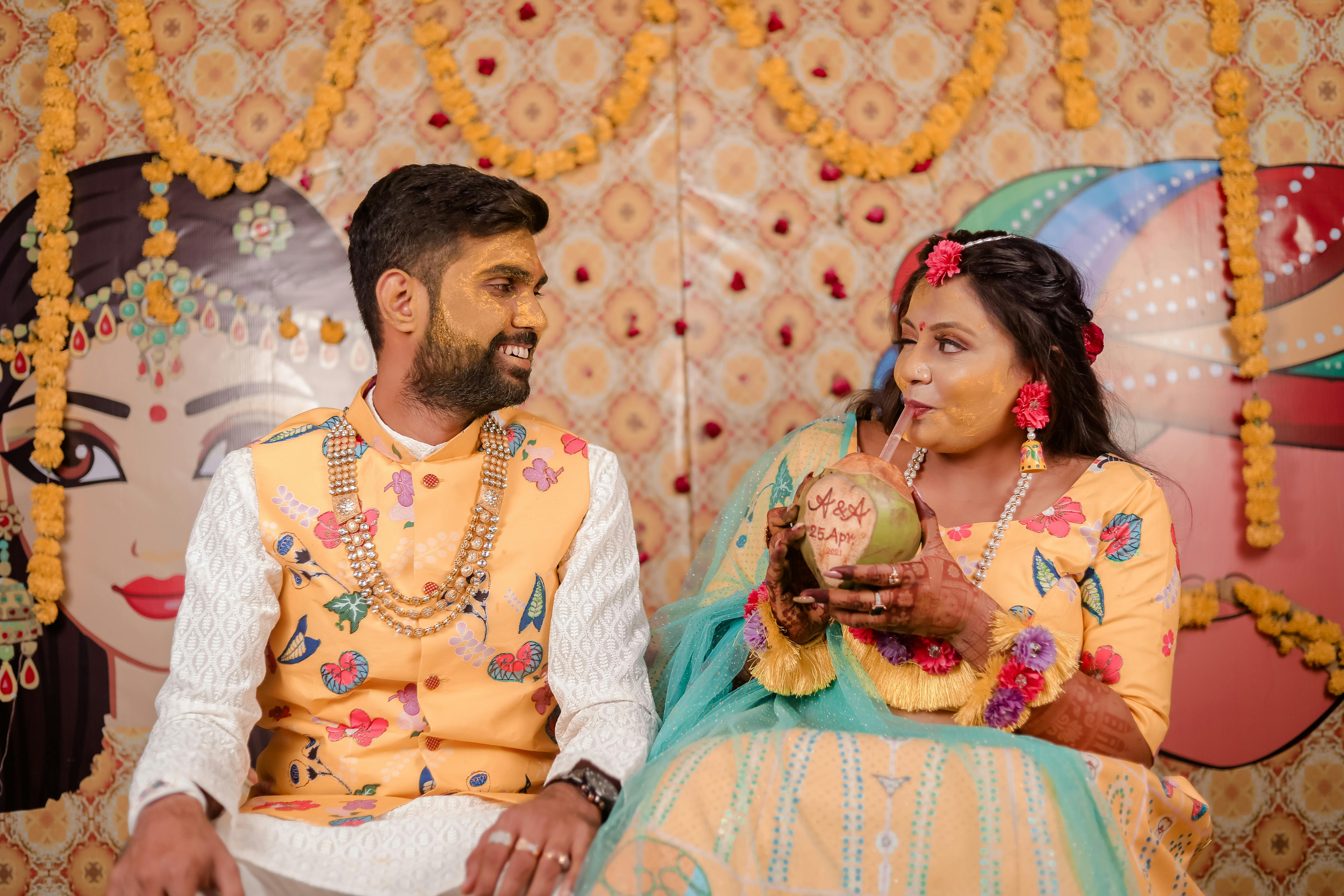 Woman Drinking Coconut Juice While the Man is Looking at Her · Free ...