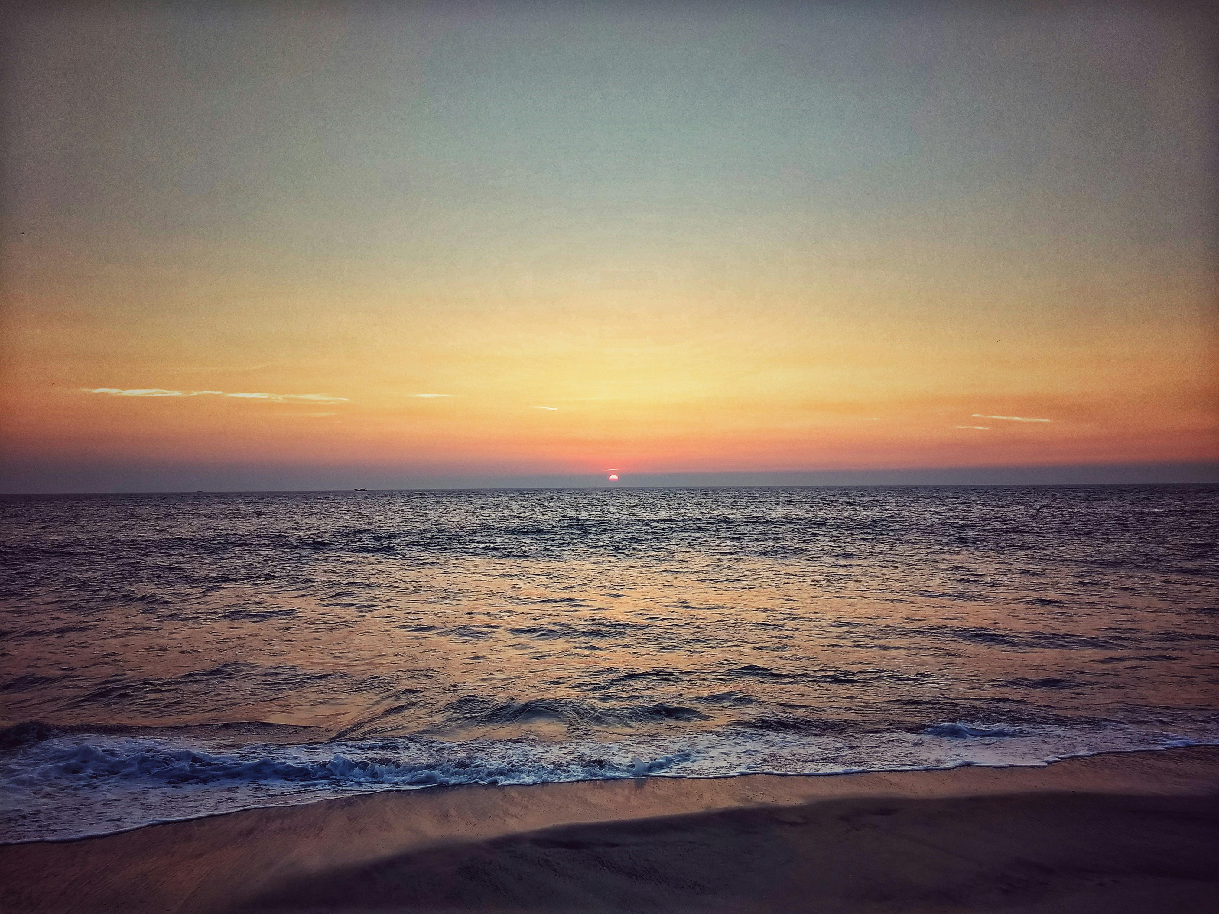 Seaside during Sun Set · Free Stock Photo