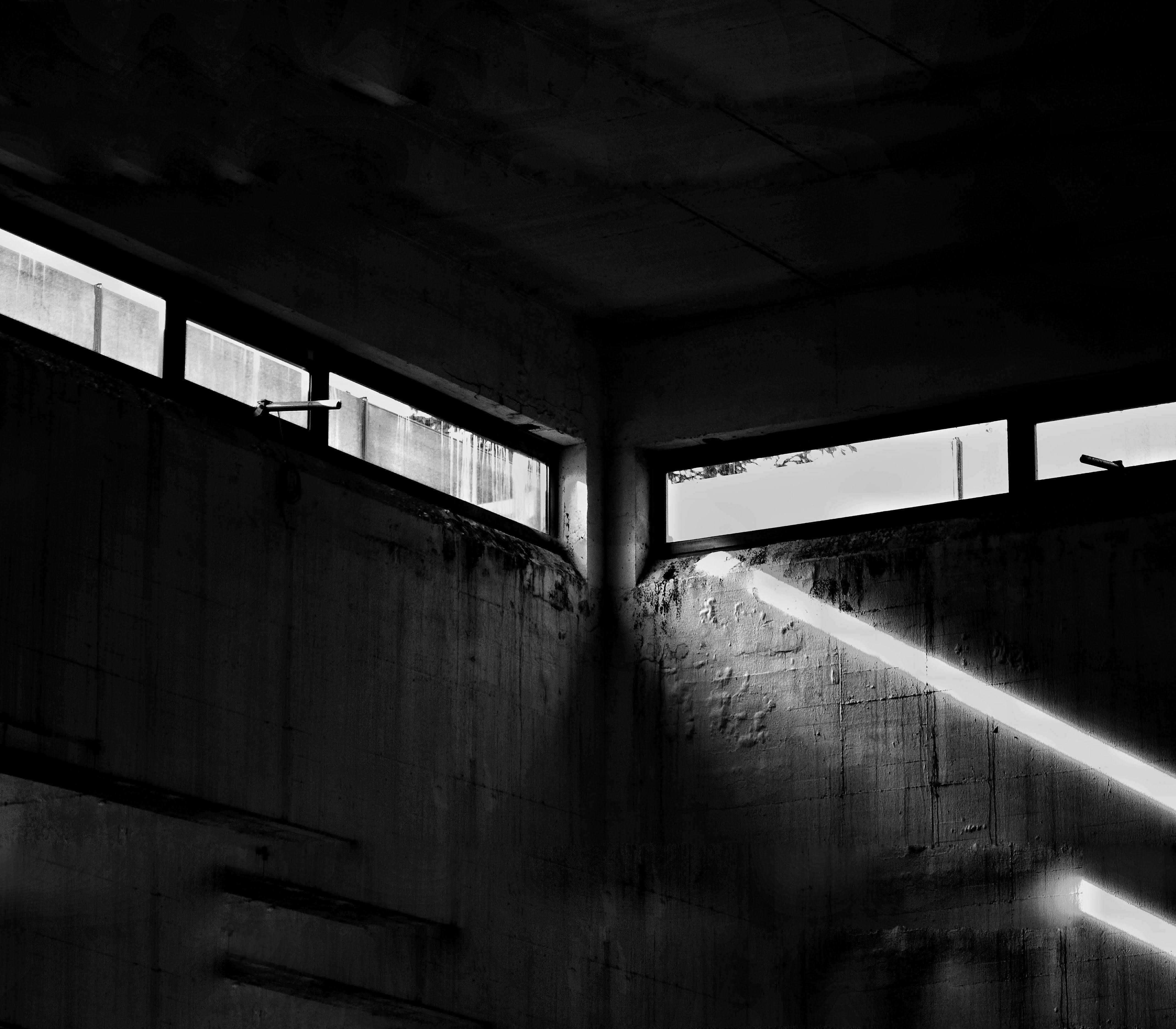 Grayscale Photography of an Old Concrete Structure · Free Stock Photo