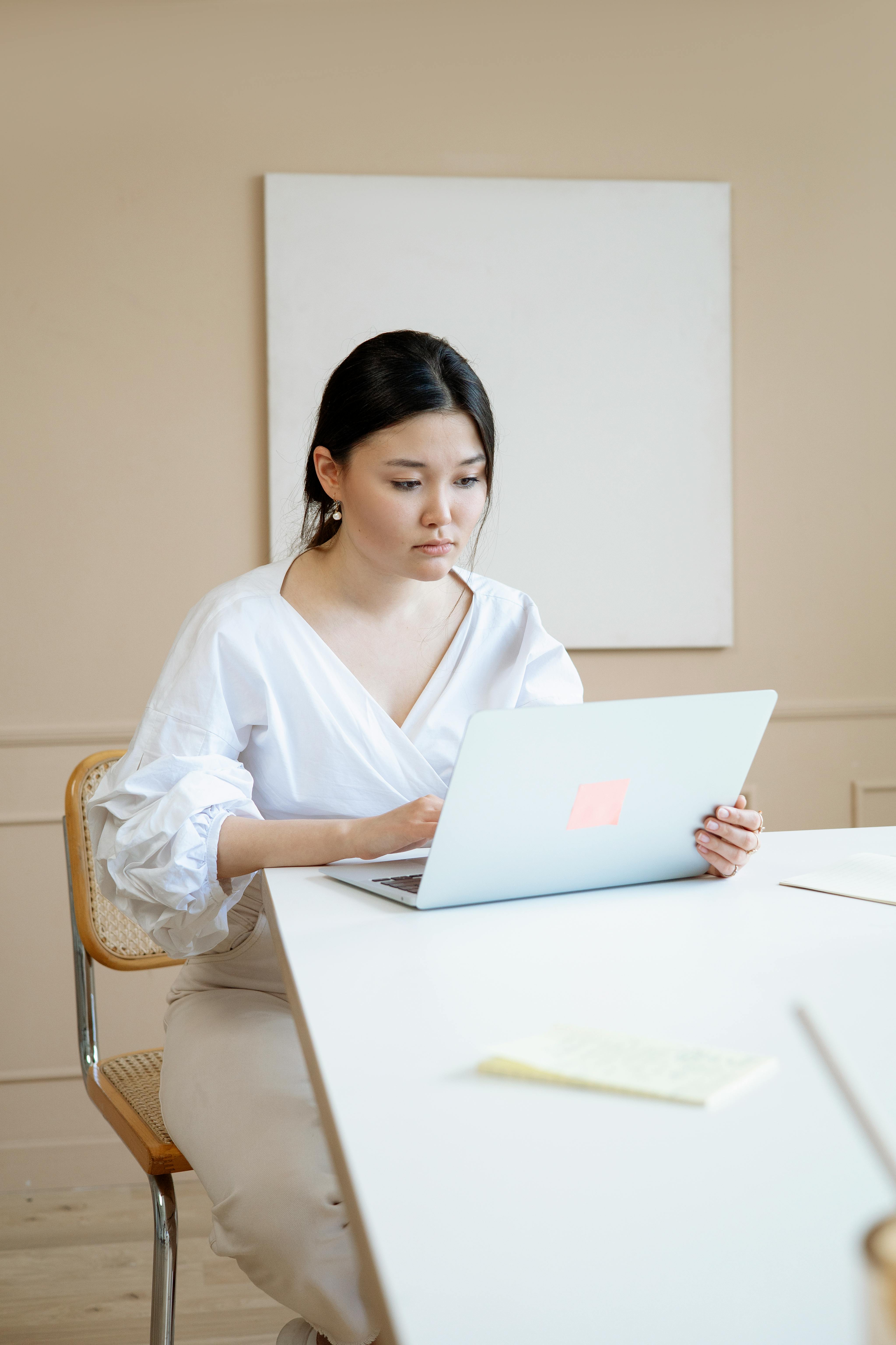 Top View Shot of People Busy Doing Their Tasks on the Table · Free ...