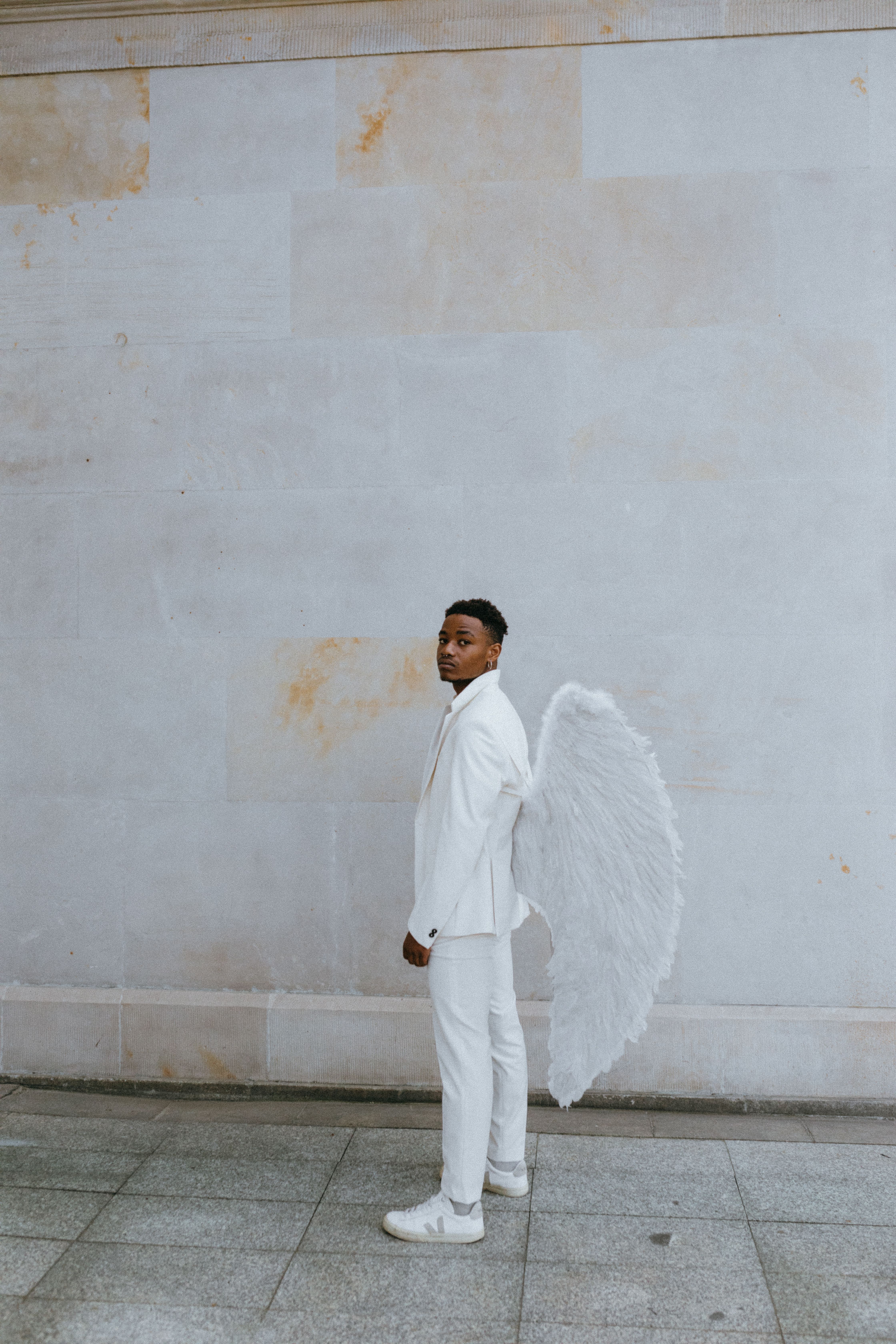 A Man Wearing an Angel Costume · Free Stock Photo