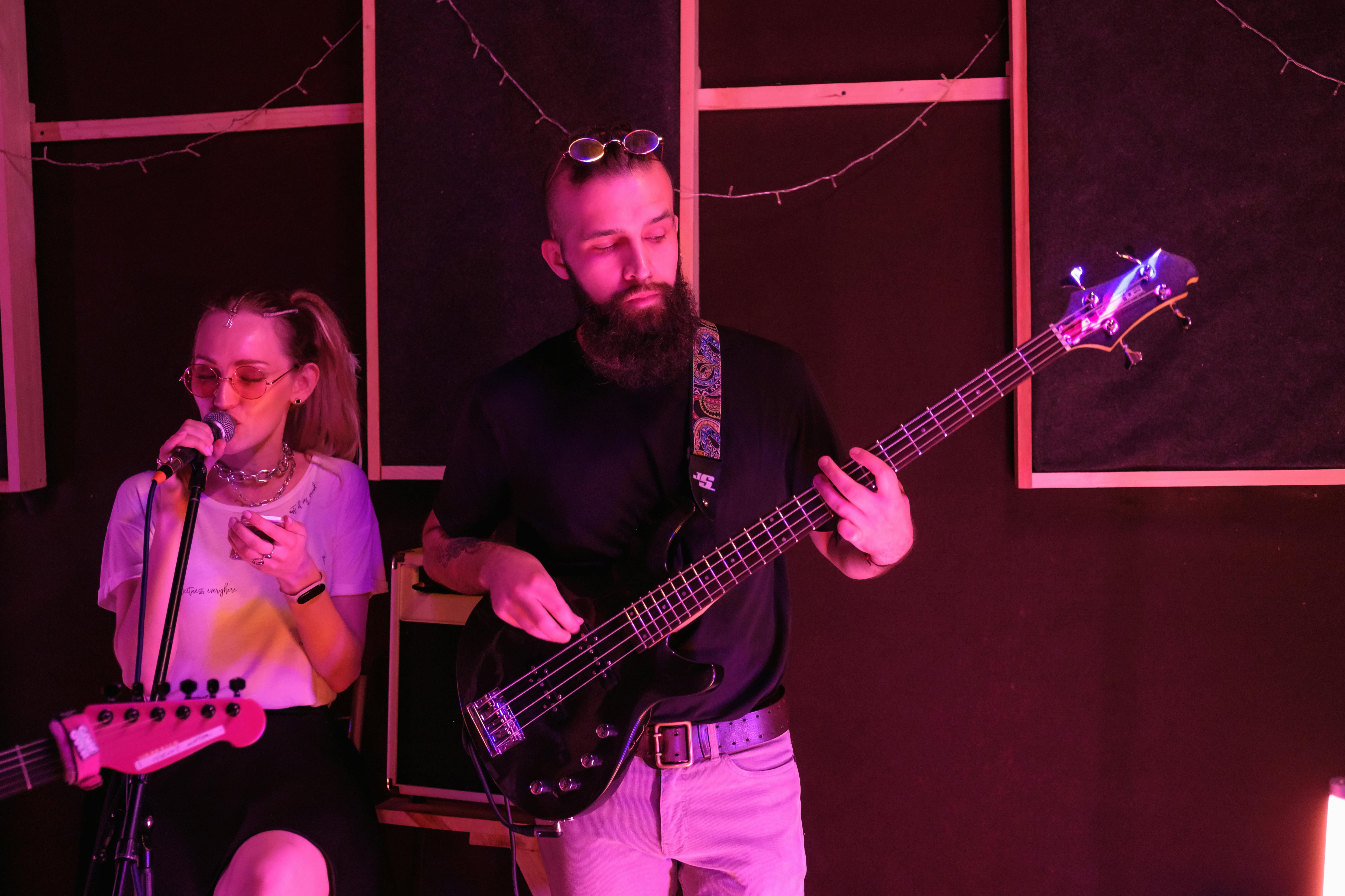 A Singer and a Bassist · Free Stock Photo