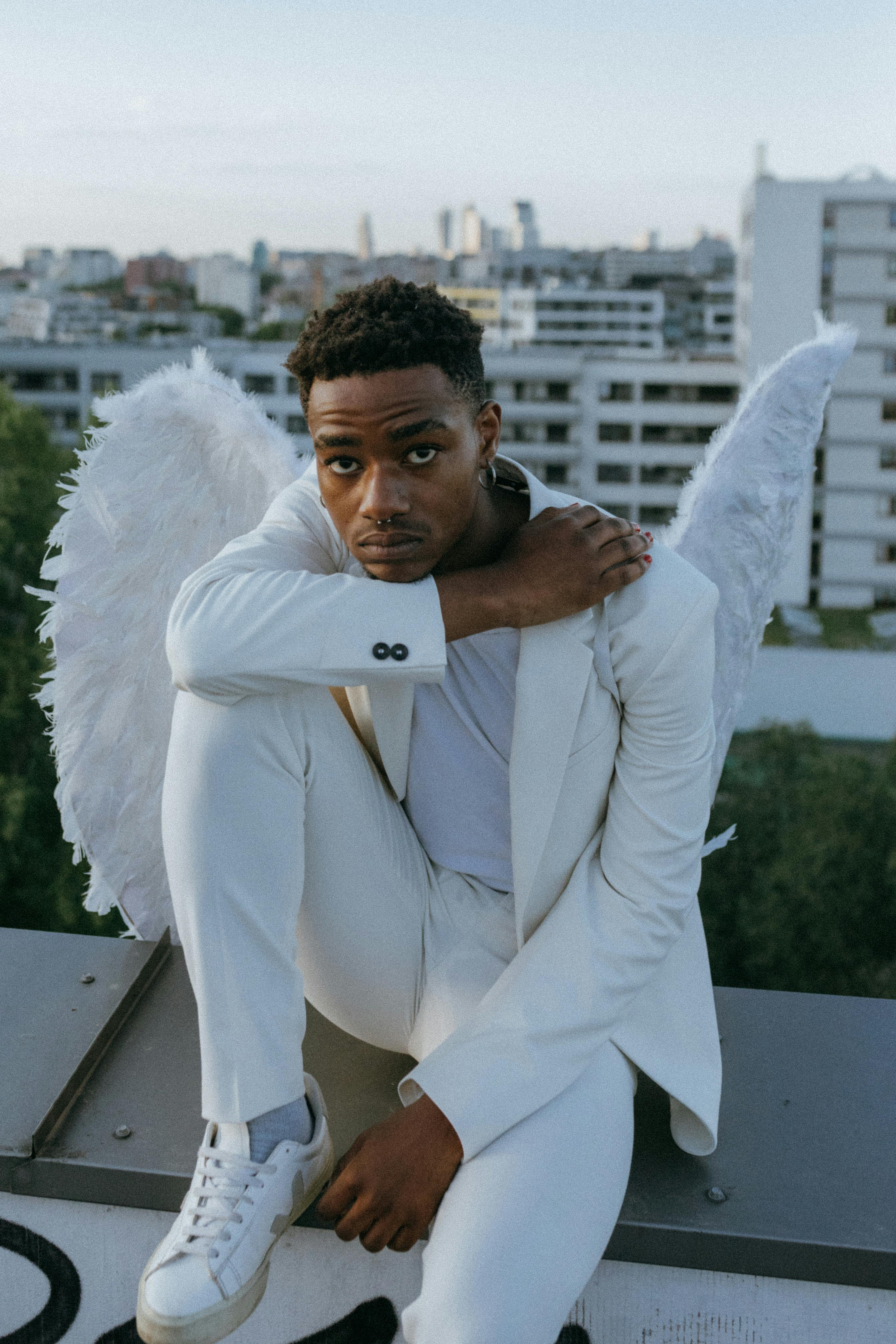 A Man Wearing an Angel Costume · Free Stock Photo