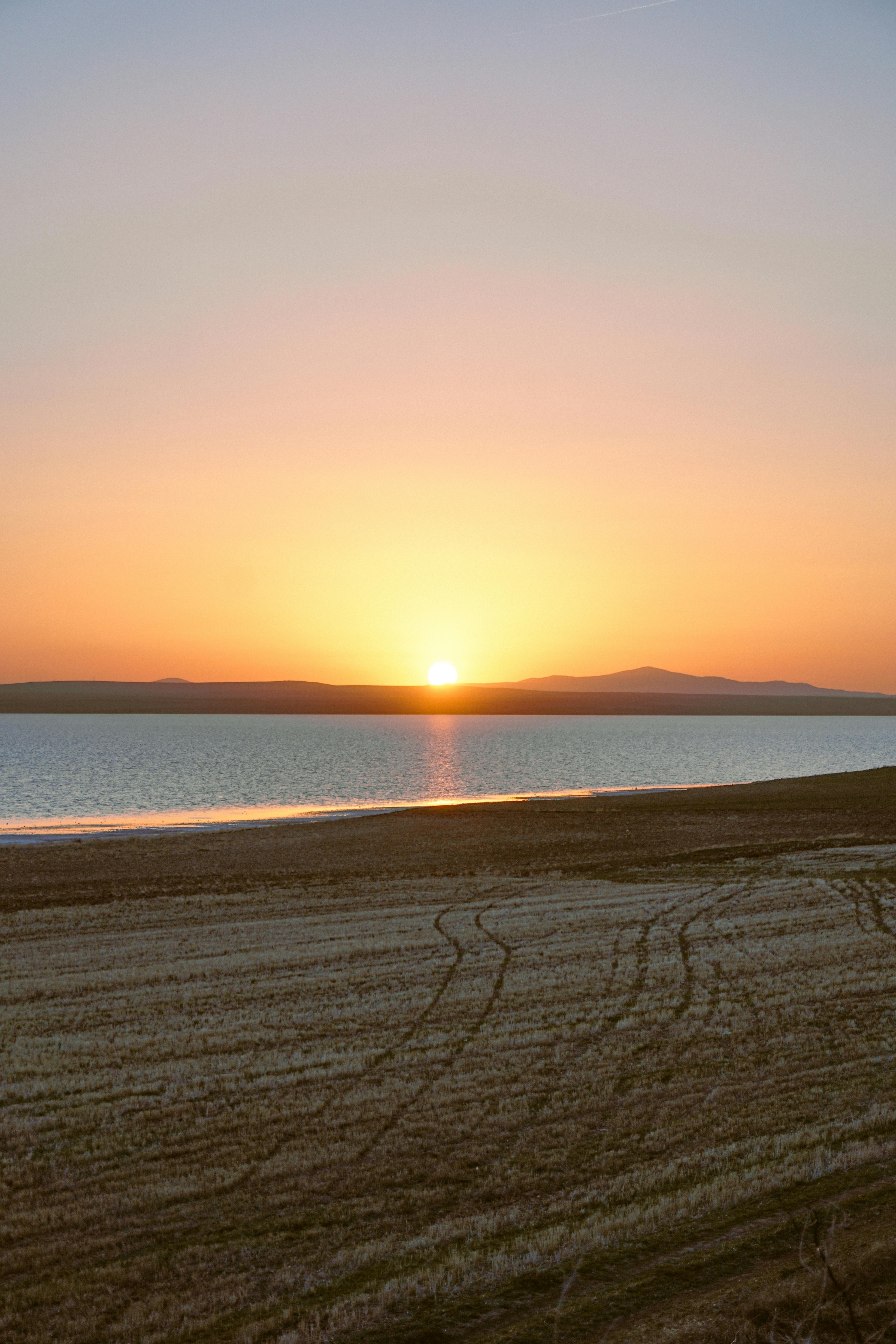 Body of Water during Sunset · Free Stock Photo