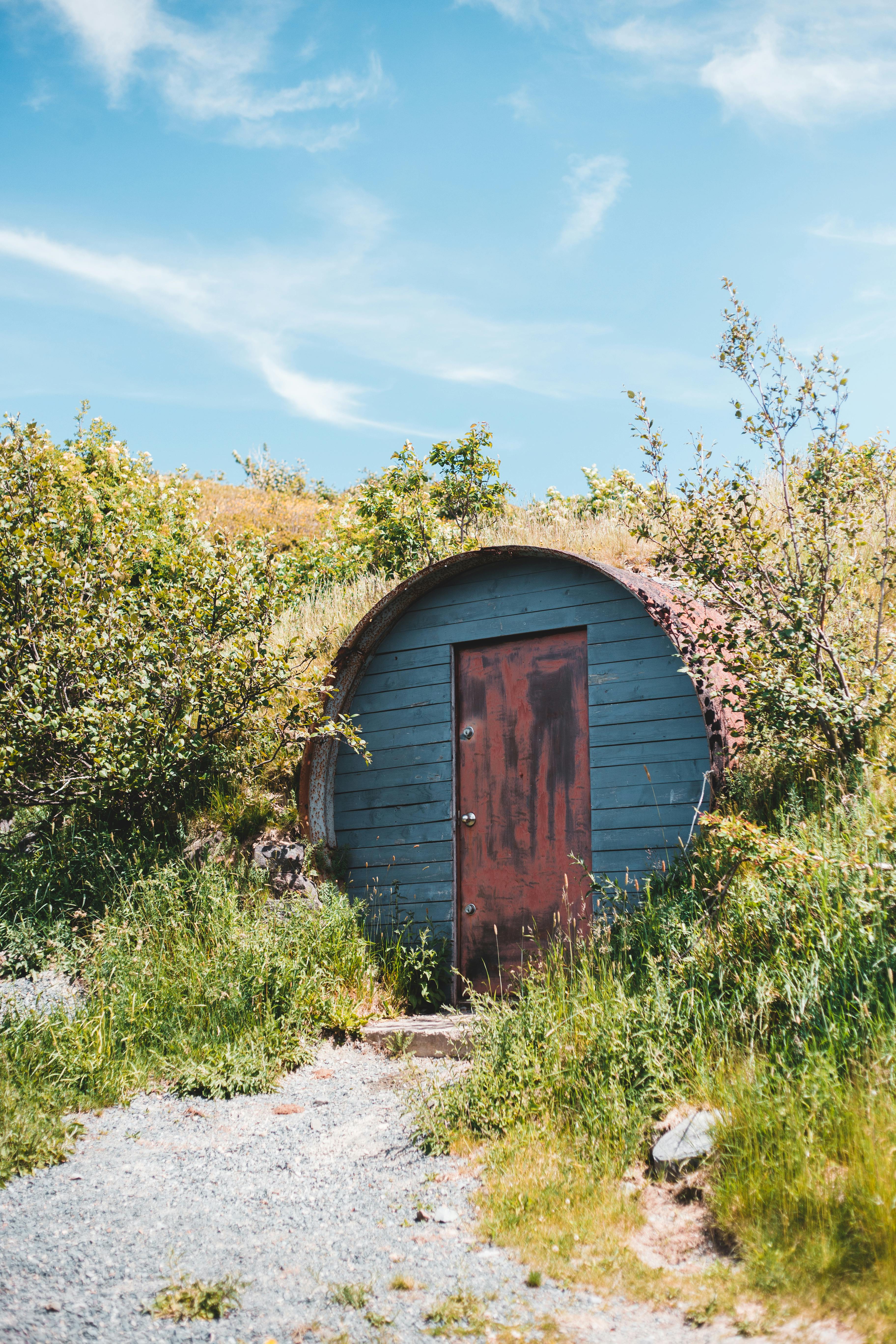 Round Bunker Entrance and Bushes · Free Stock Photo