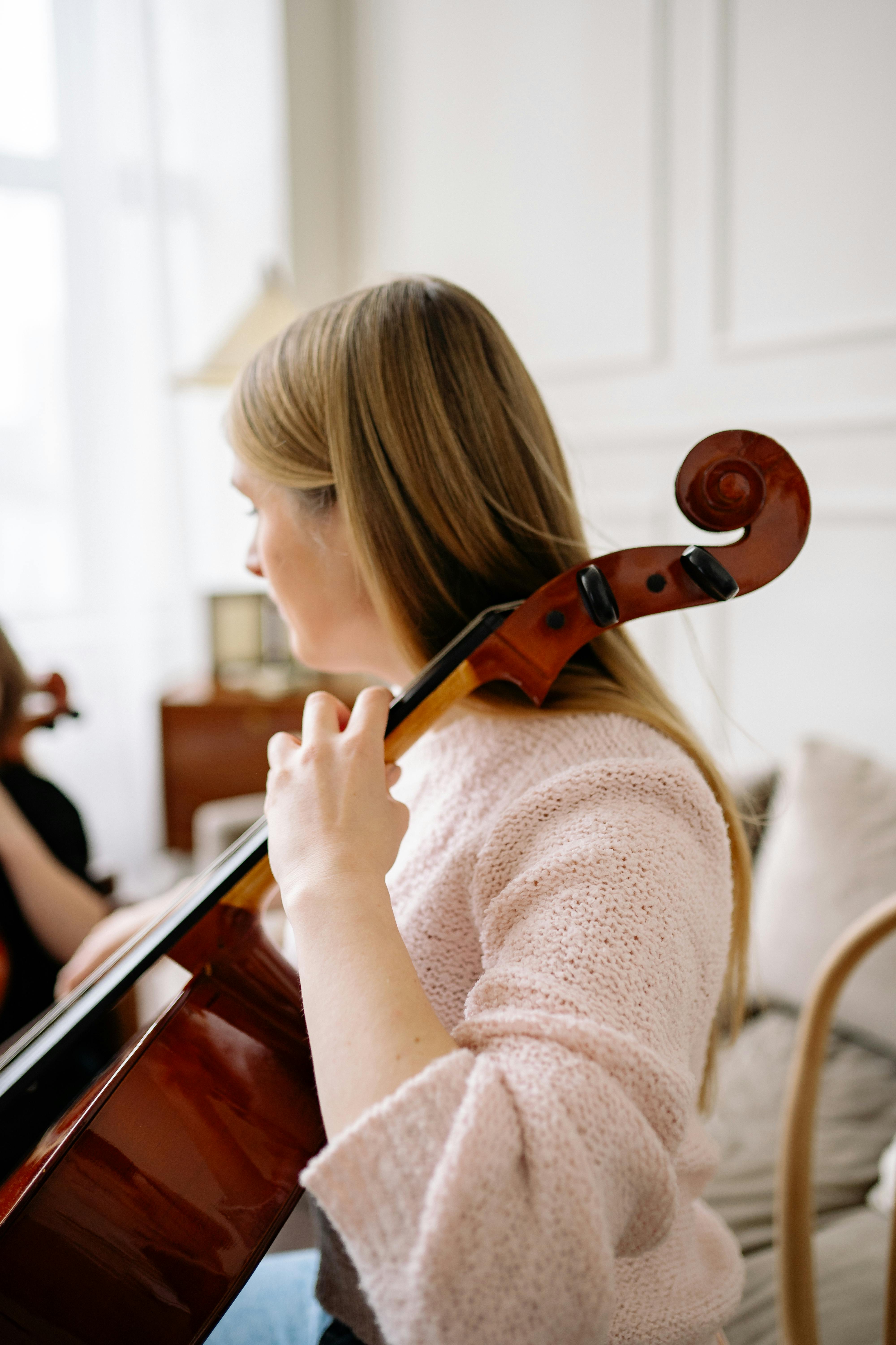 Woman Playing the Cello · Free Stock Photo