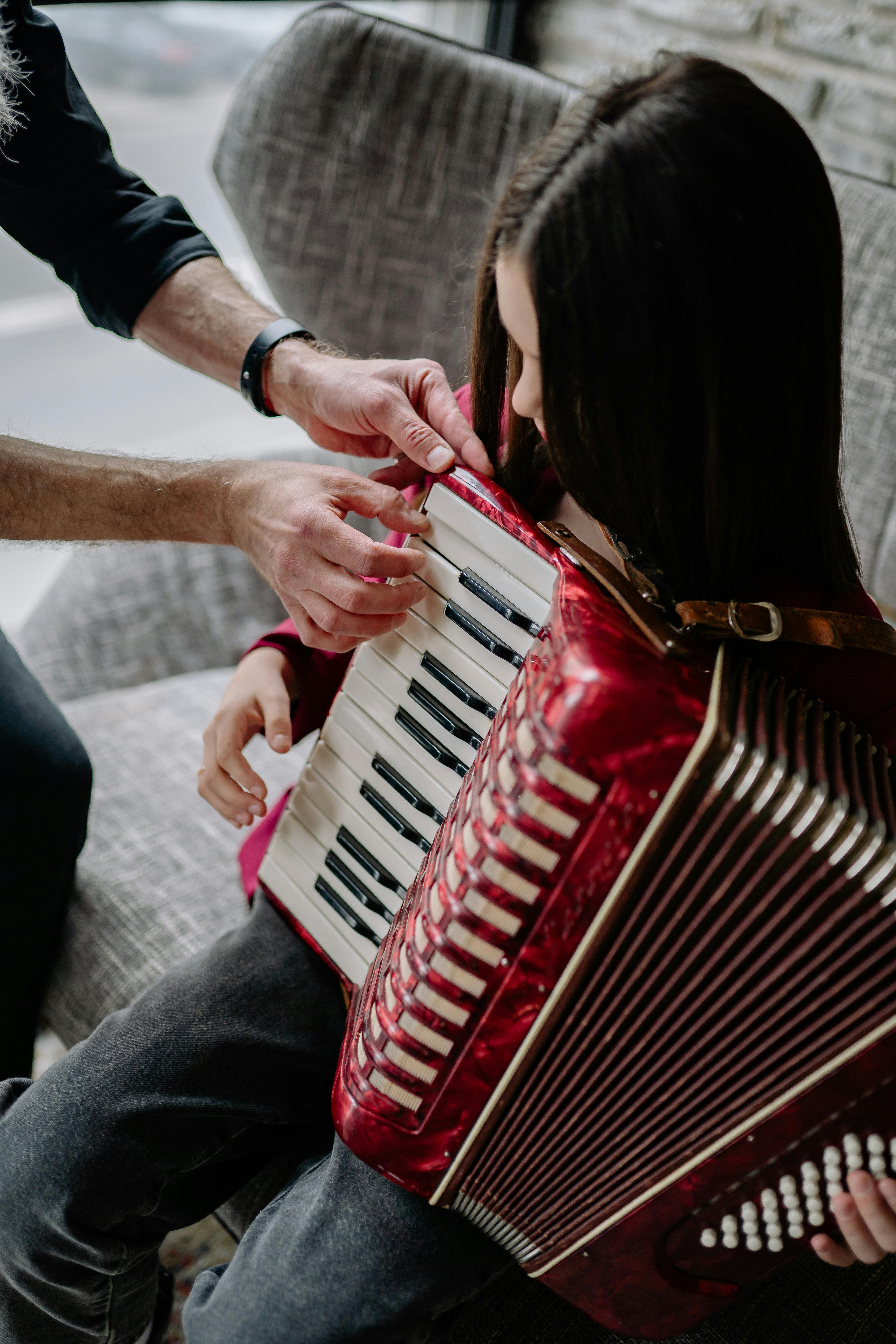 People Playing Piano with Sheet Music · Free Stock Photo