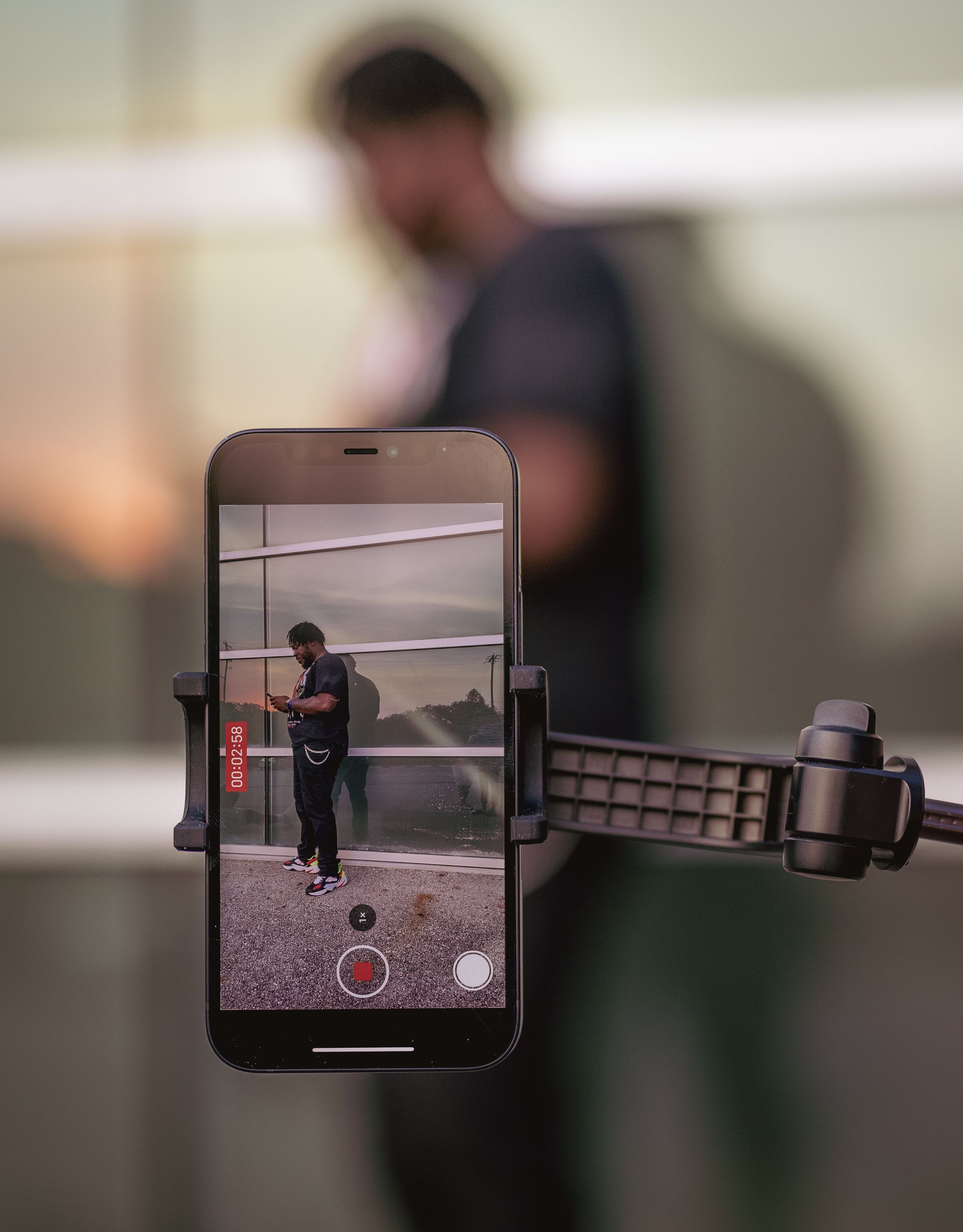Smart Phone Recording a Video of a City Street Through a Wet Window ...