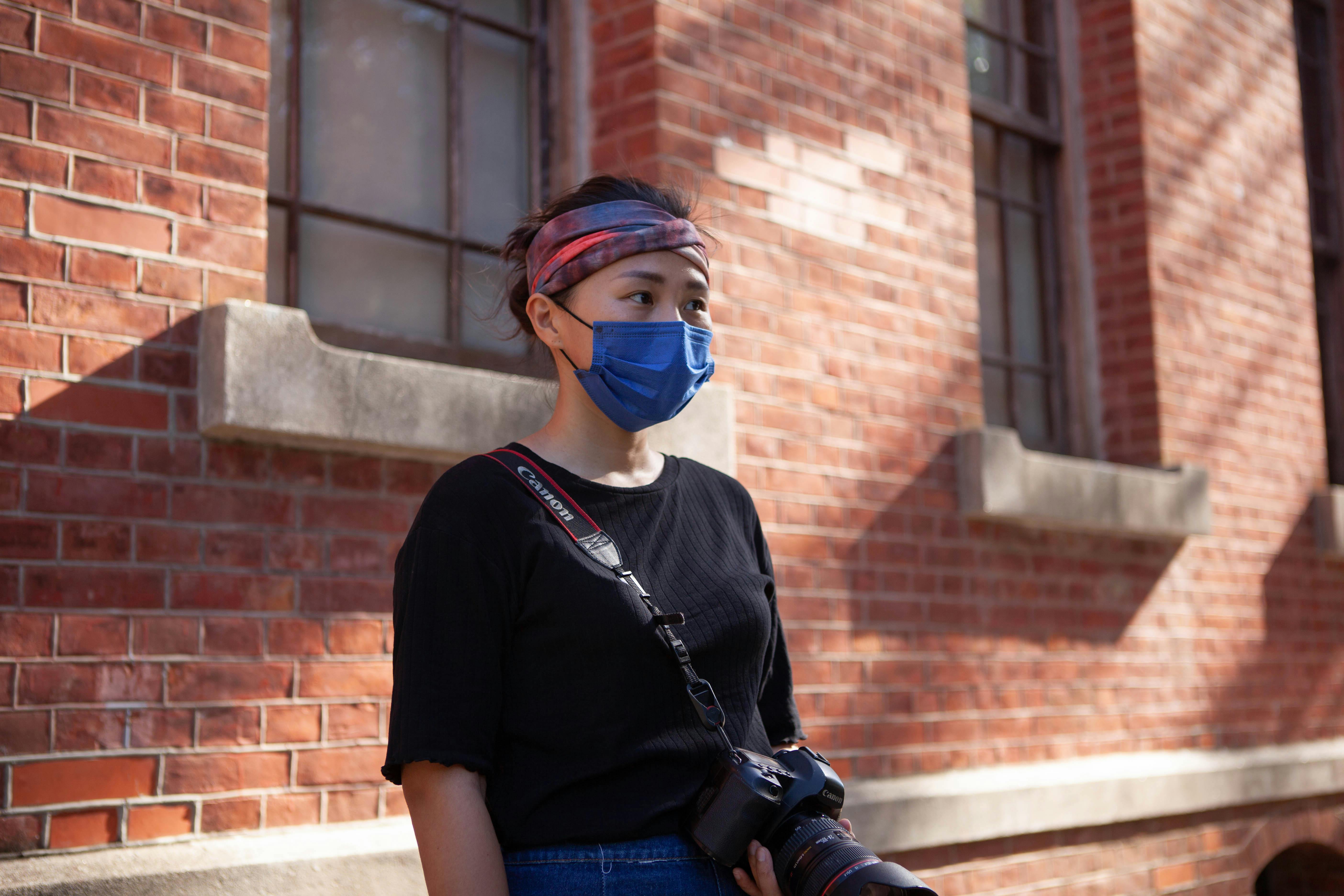 Woman Wearing a Blue Face Mask · Free Stock Photo