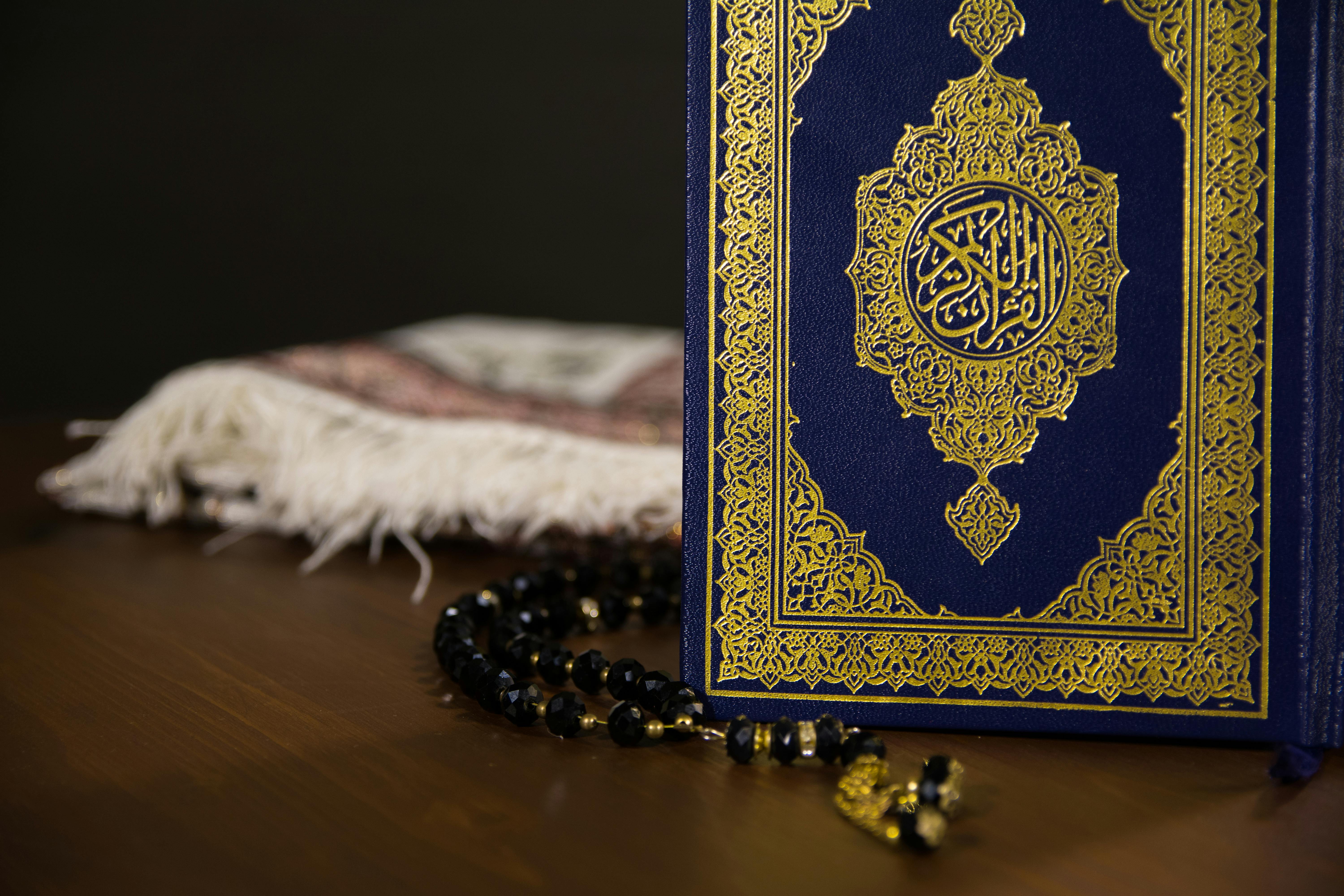 Beautiful Islamic Calligraphy on Quran Cover · Free Stock Photo