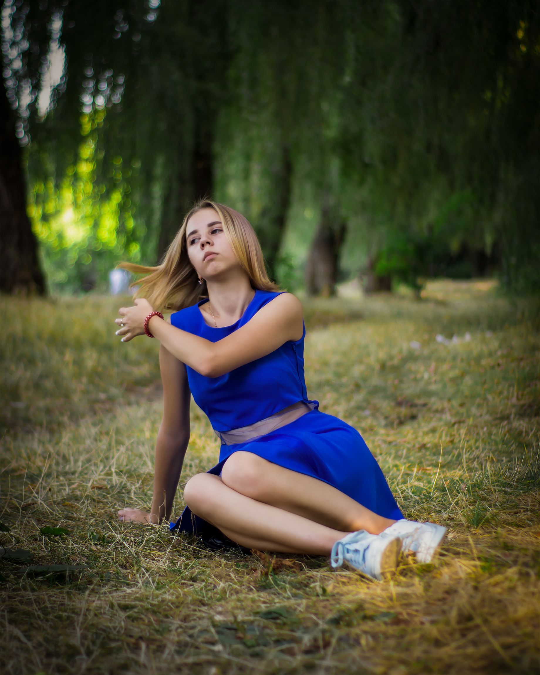 Blonde in Yellow Negligee Sitting on Grass · Free Stock Photo
