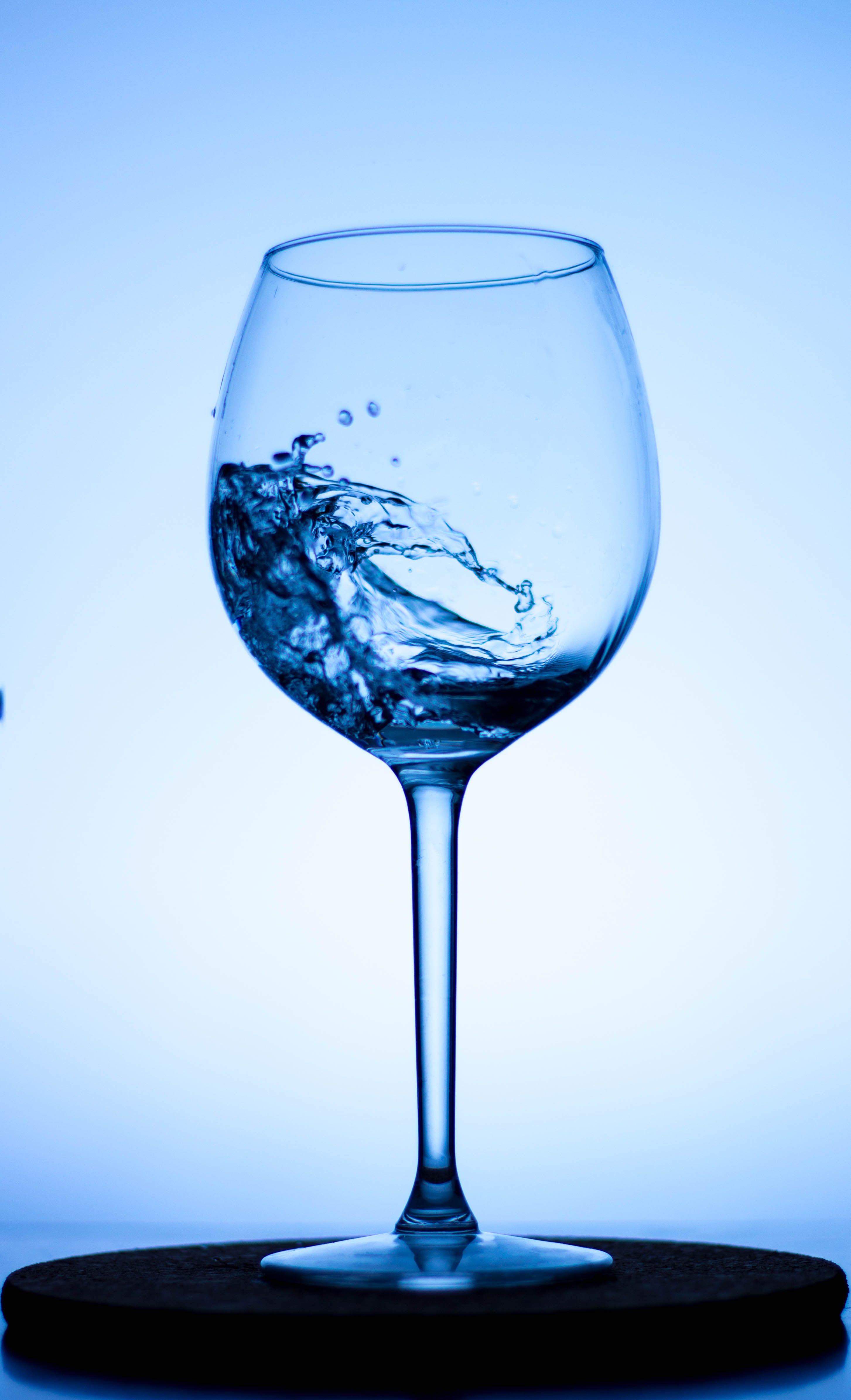 Close Up Photo of Water in Wine Glass · Free Stock Photo