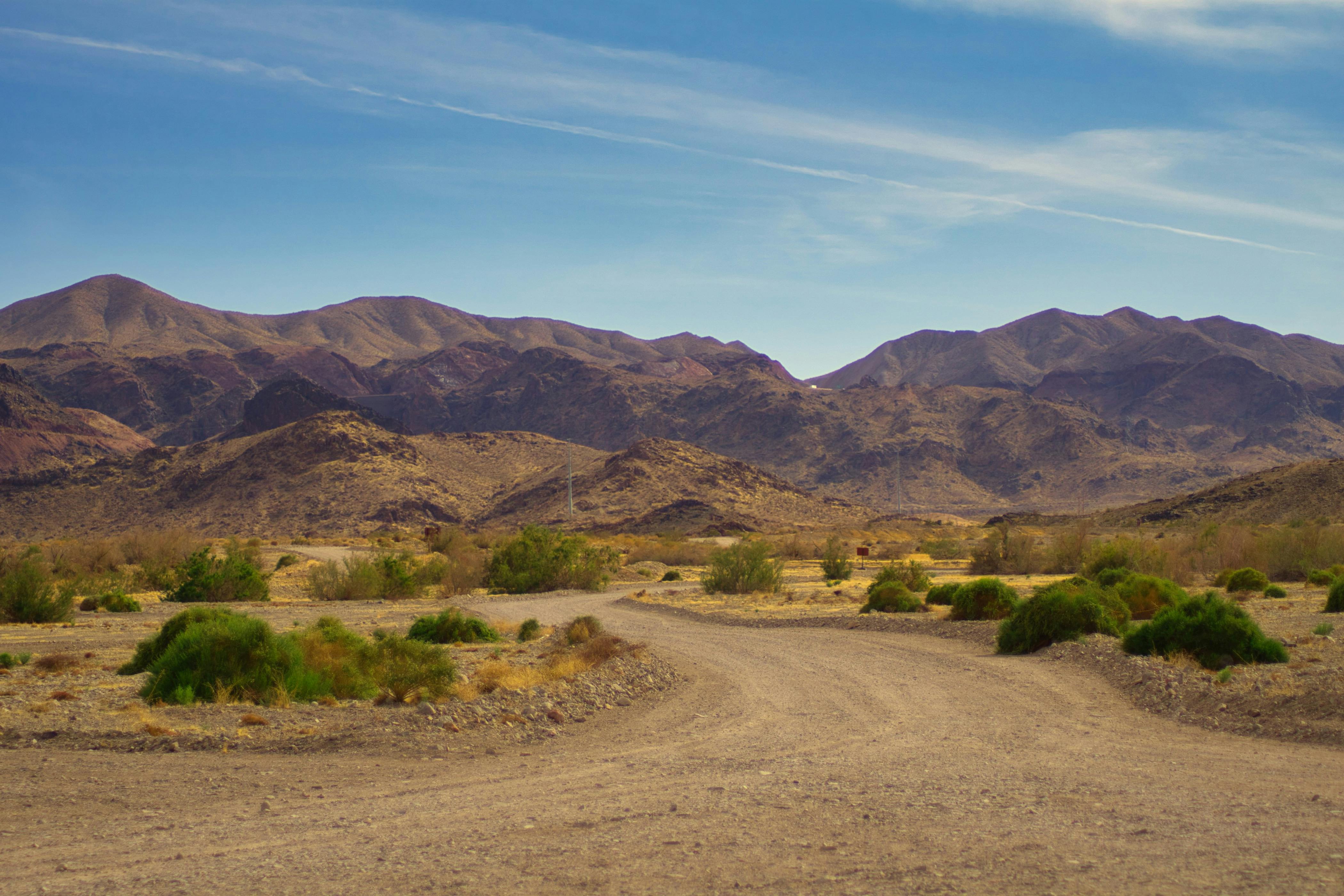 Gray Rocky Mountains Under Blue Sky · Free Stock Photo
