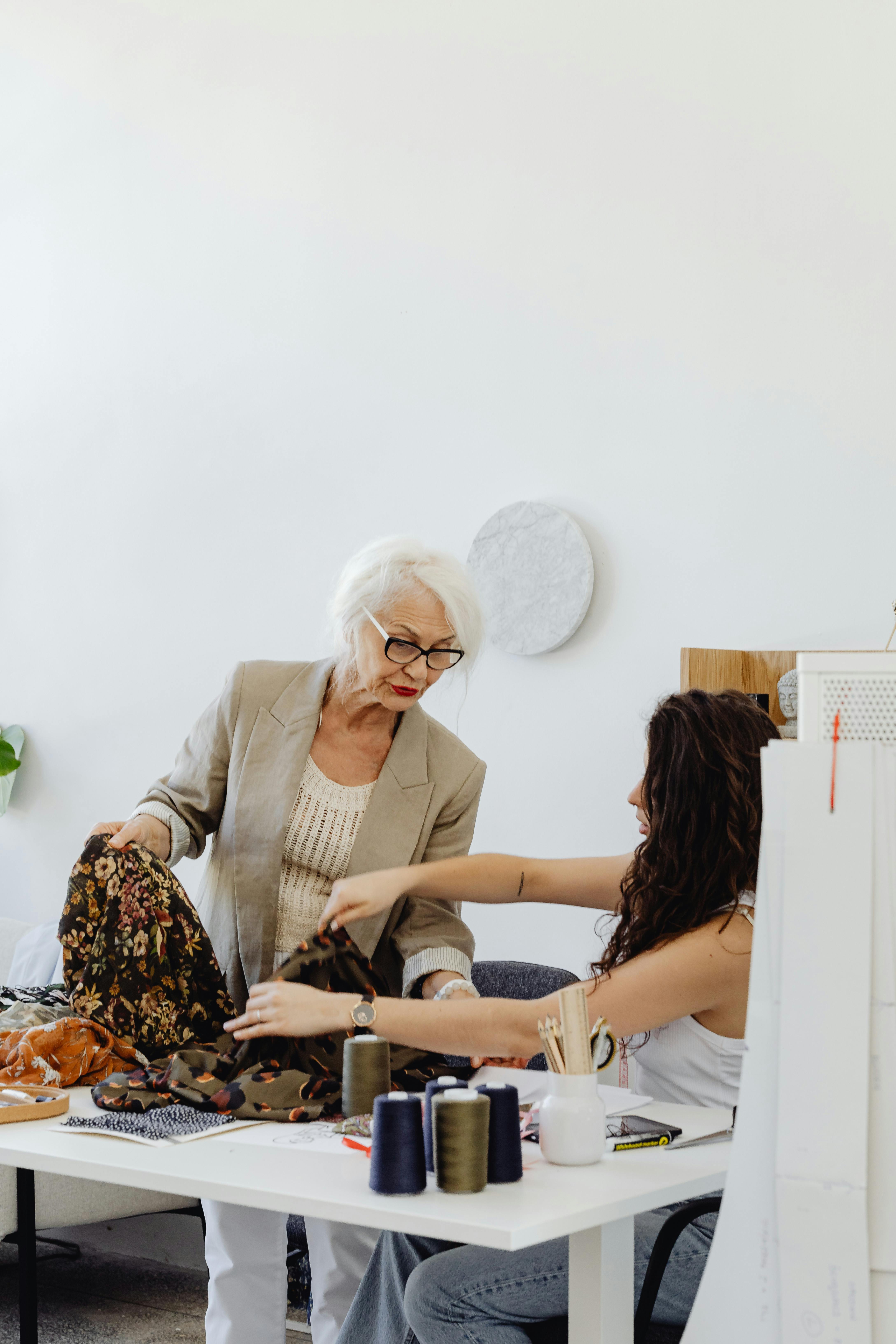 Women Designing Clothes in an Office · Free Stock Photo