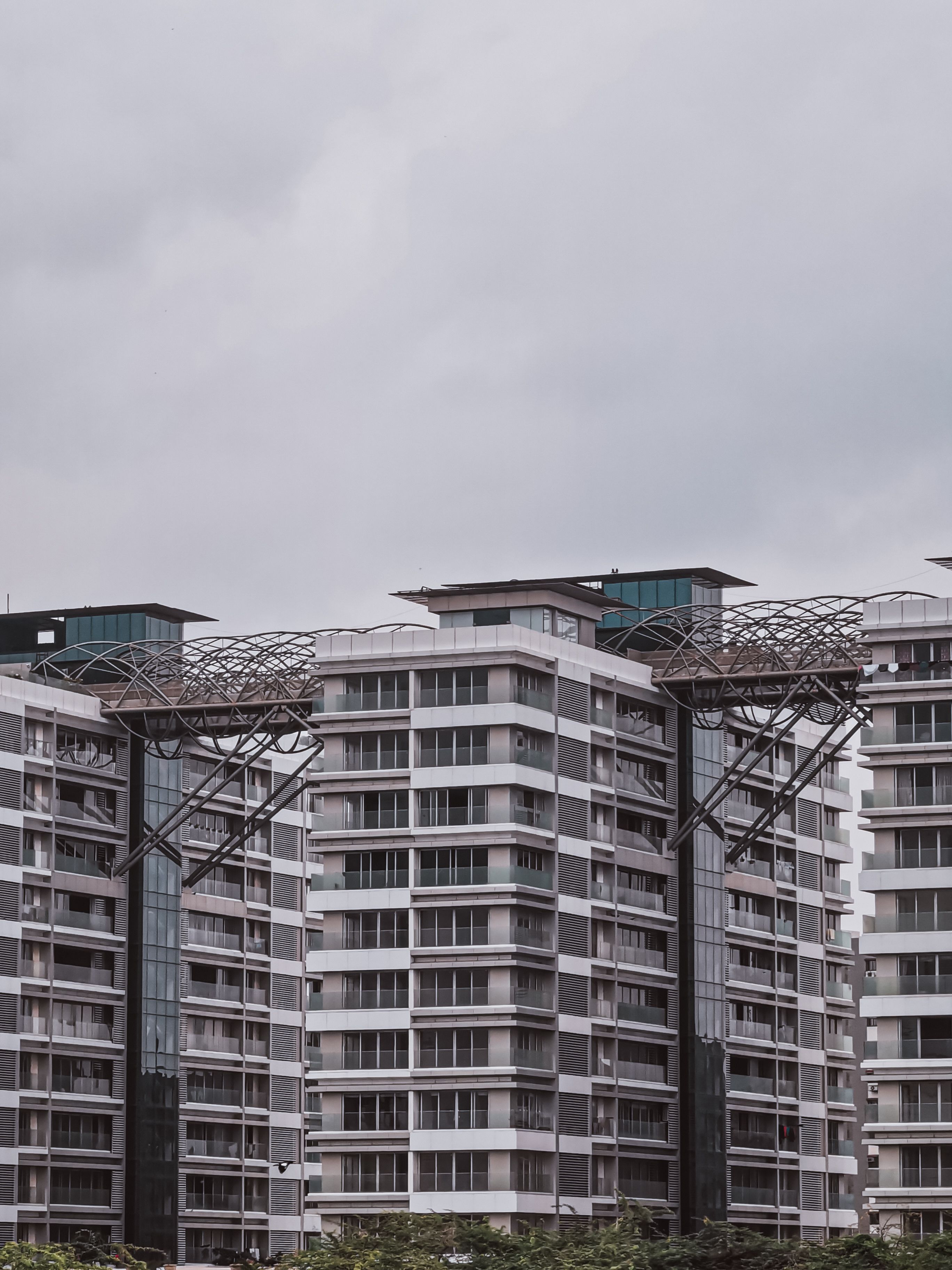 Gray and Brown Tower Telescope Near Trees and High Rise Buildings ...