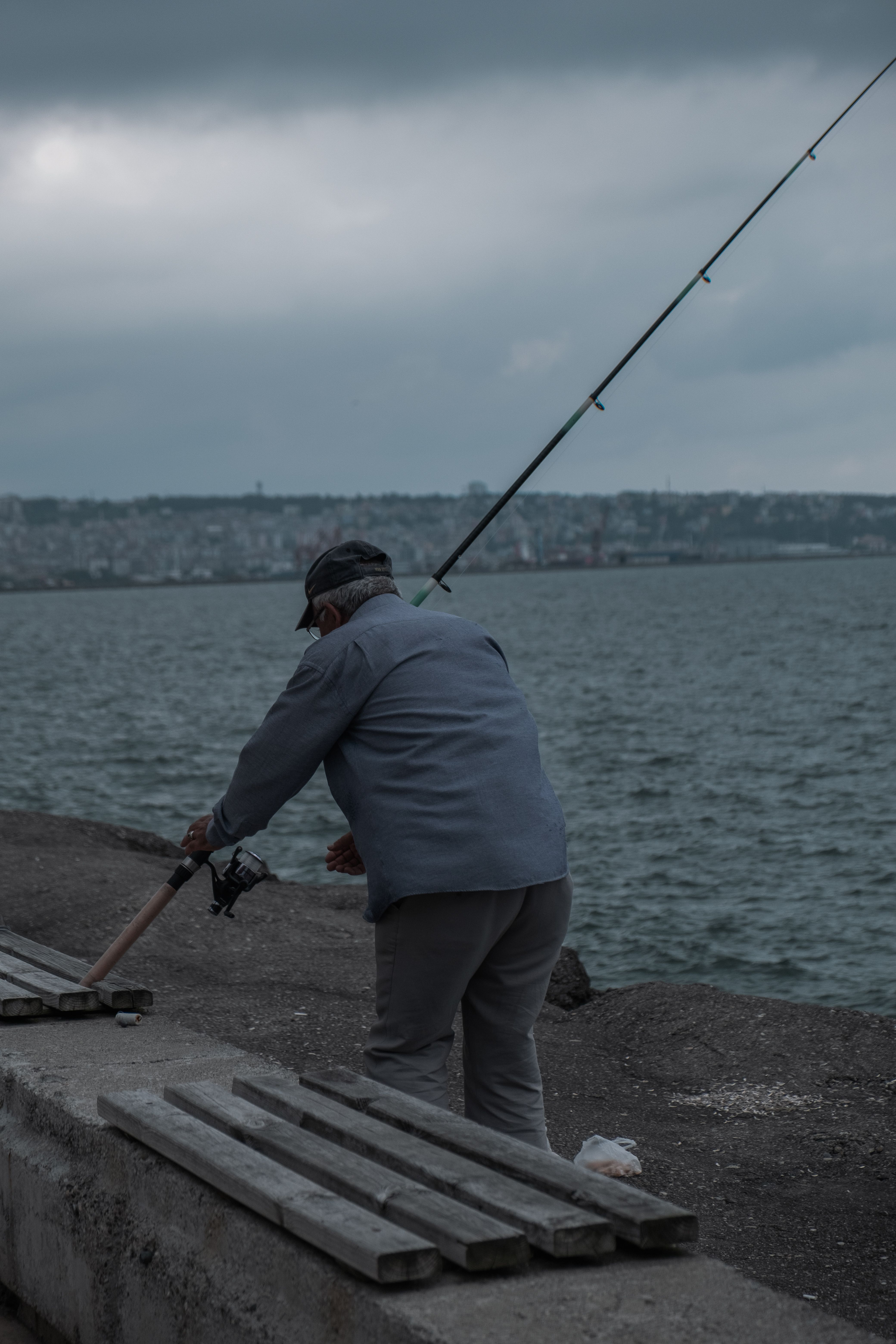 A Man Fishing in the Lake · Free Stock Photo