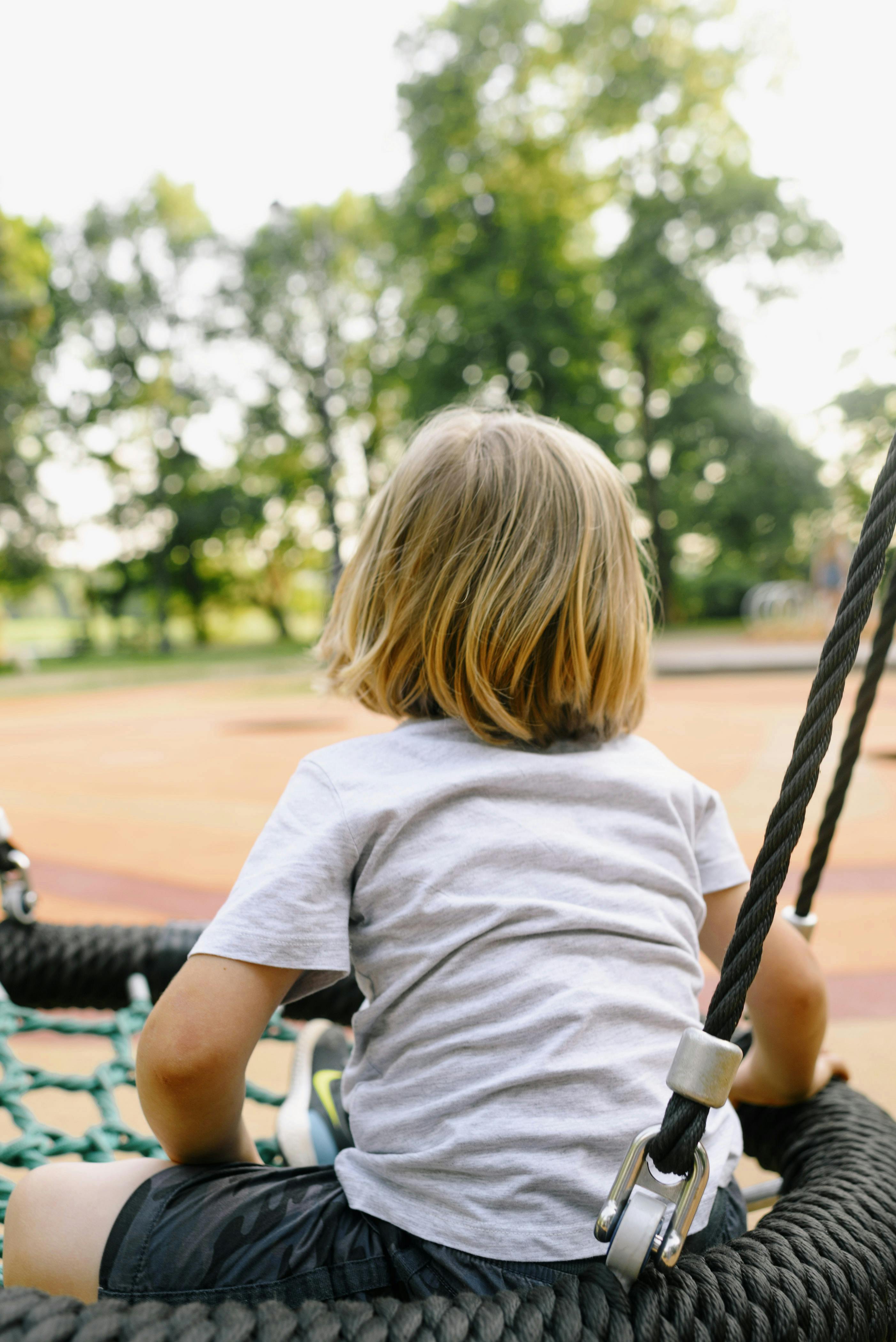 Photo of Kids Sitting on a Rope Climbing Tower on a Playground · Free ...