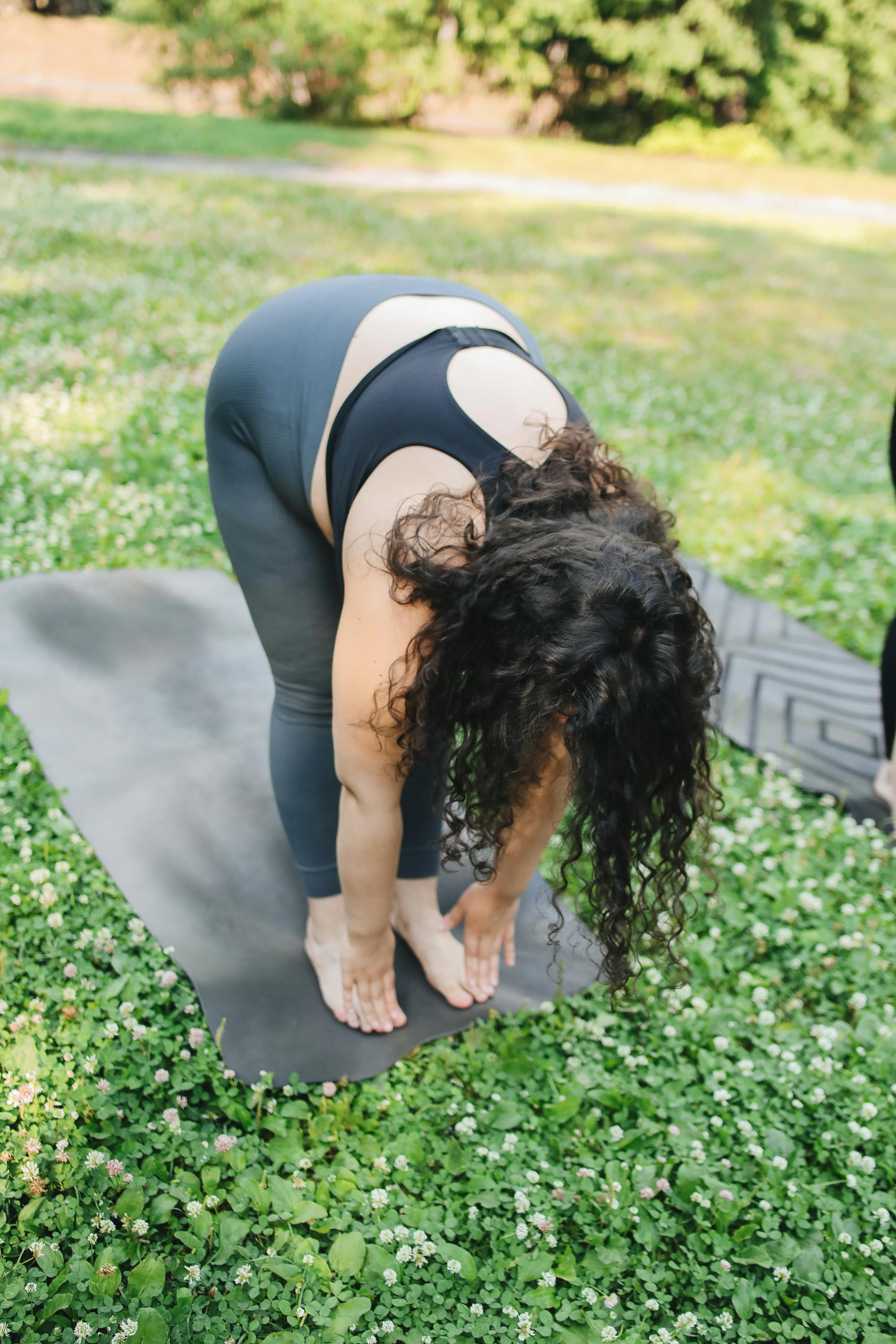 Woman Preparing Her Yoga Mat · Free Stock Photo