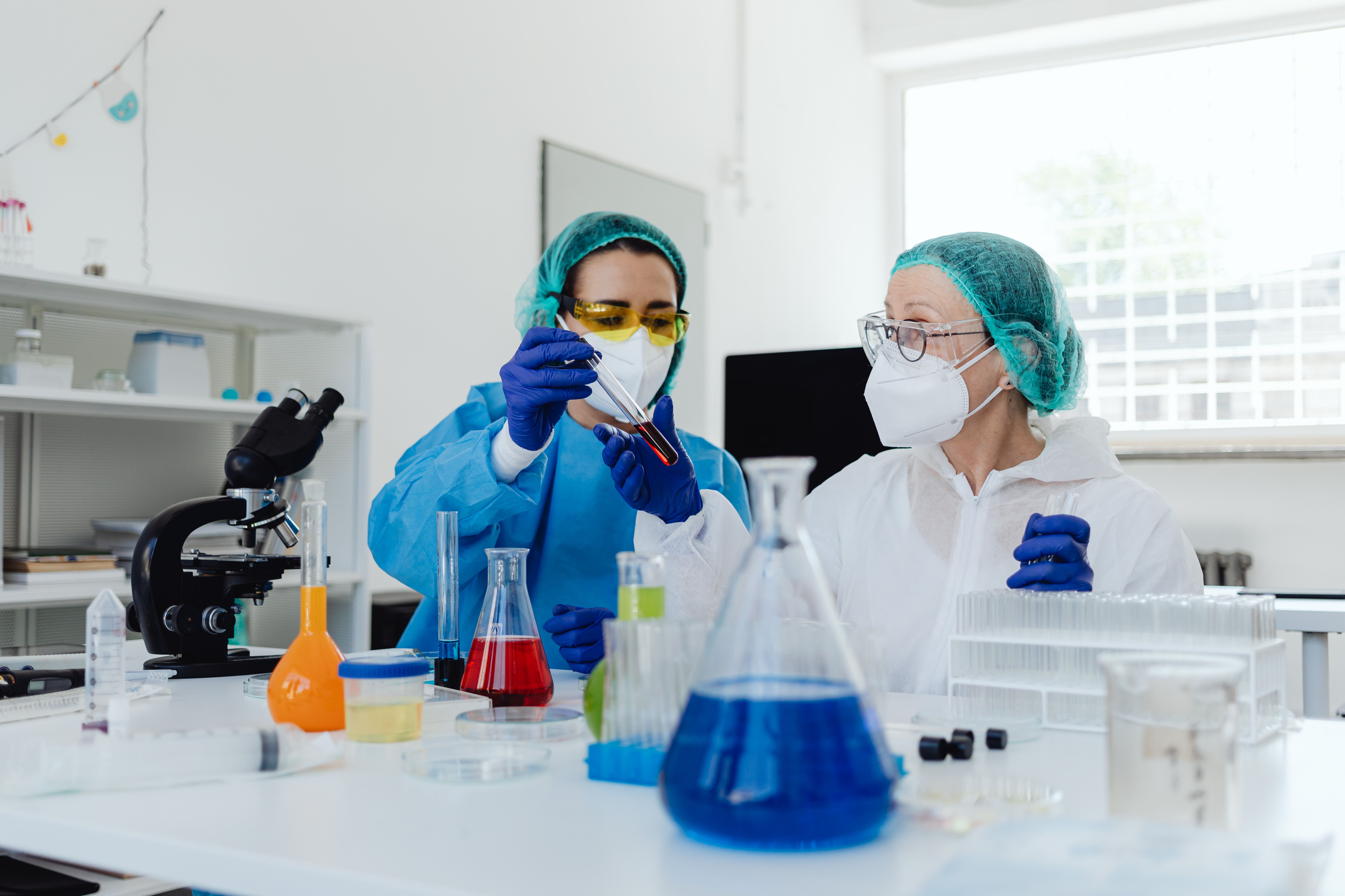 Man Doing A Sample Test In The Laboratory · Free Stock Photo