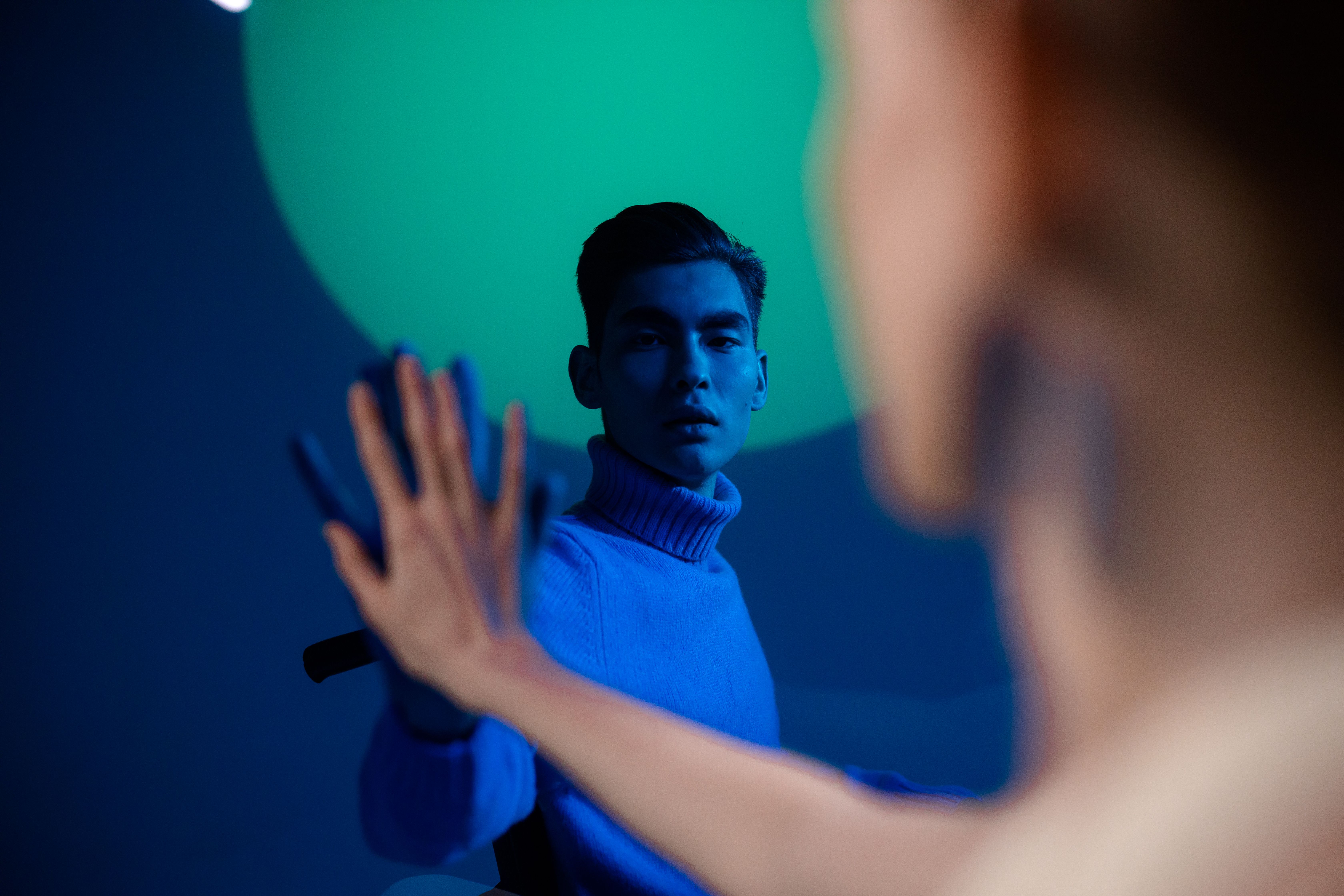 Man Working with Blue Light at Night · Free Stock Photo