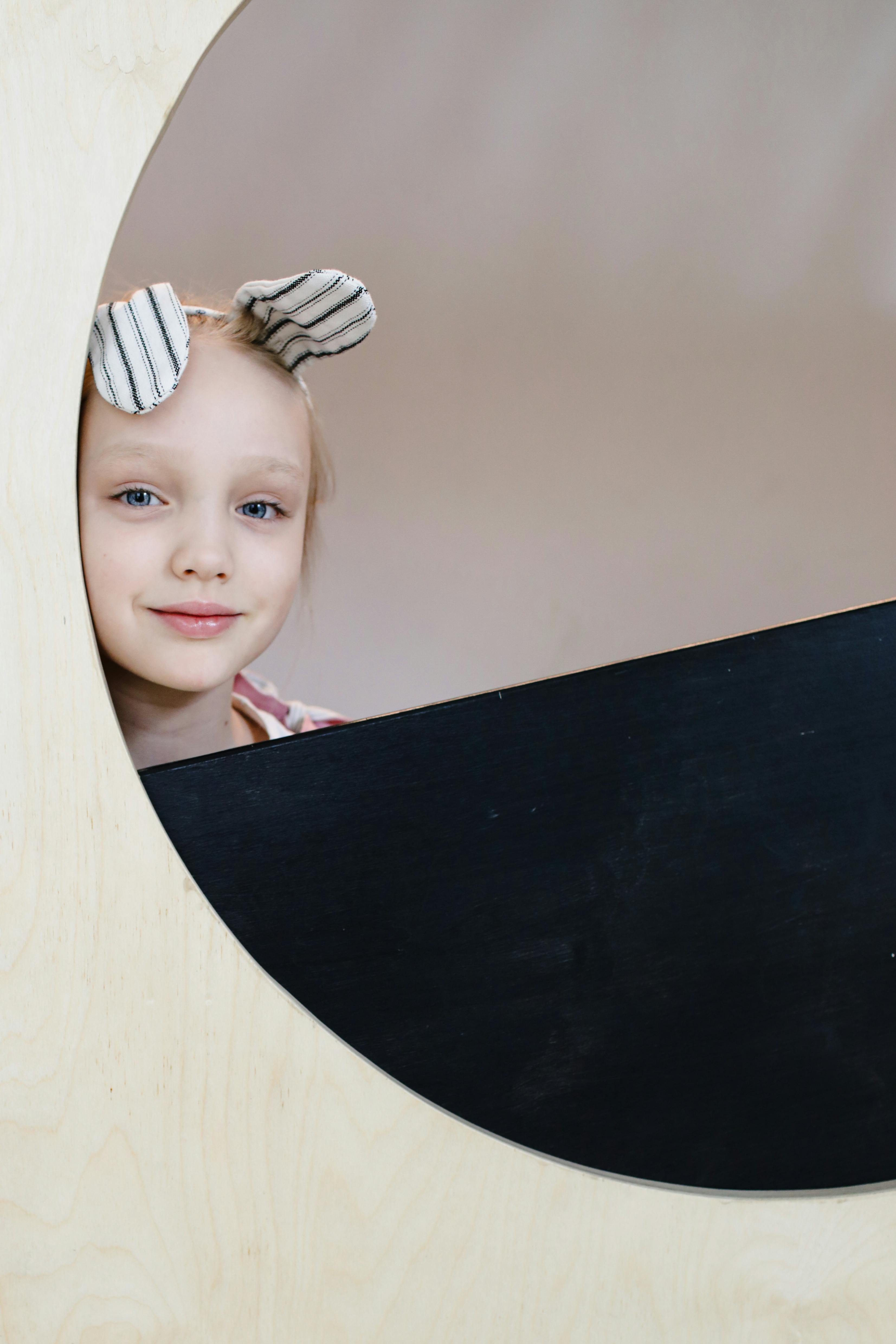 Young Girl Beside Window · Free Stock Photo