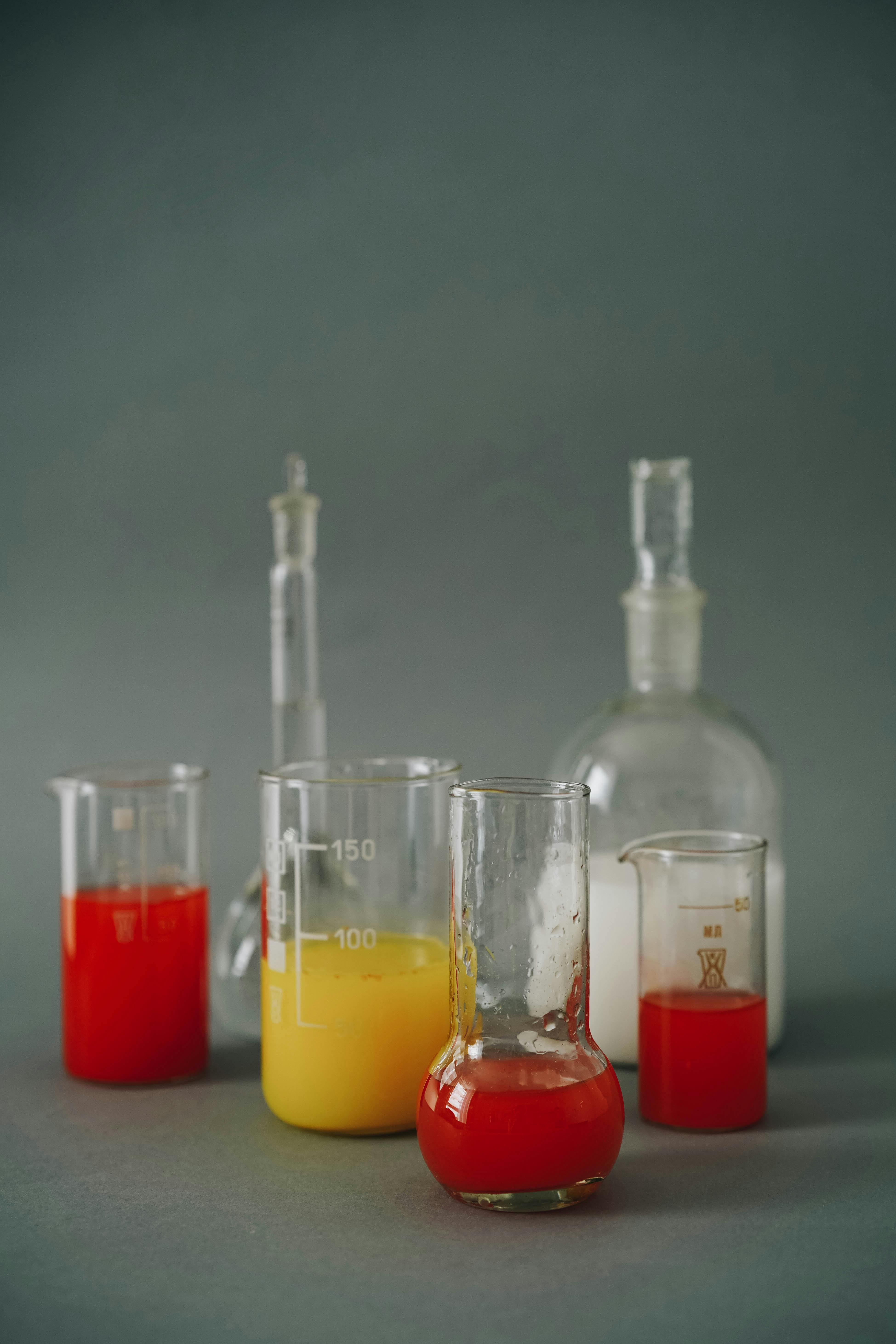 Close-Up Shot of Flasks · Free Stock Photo