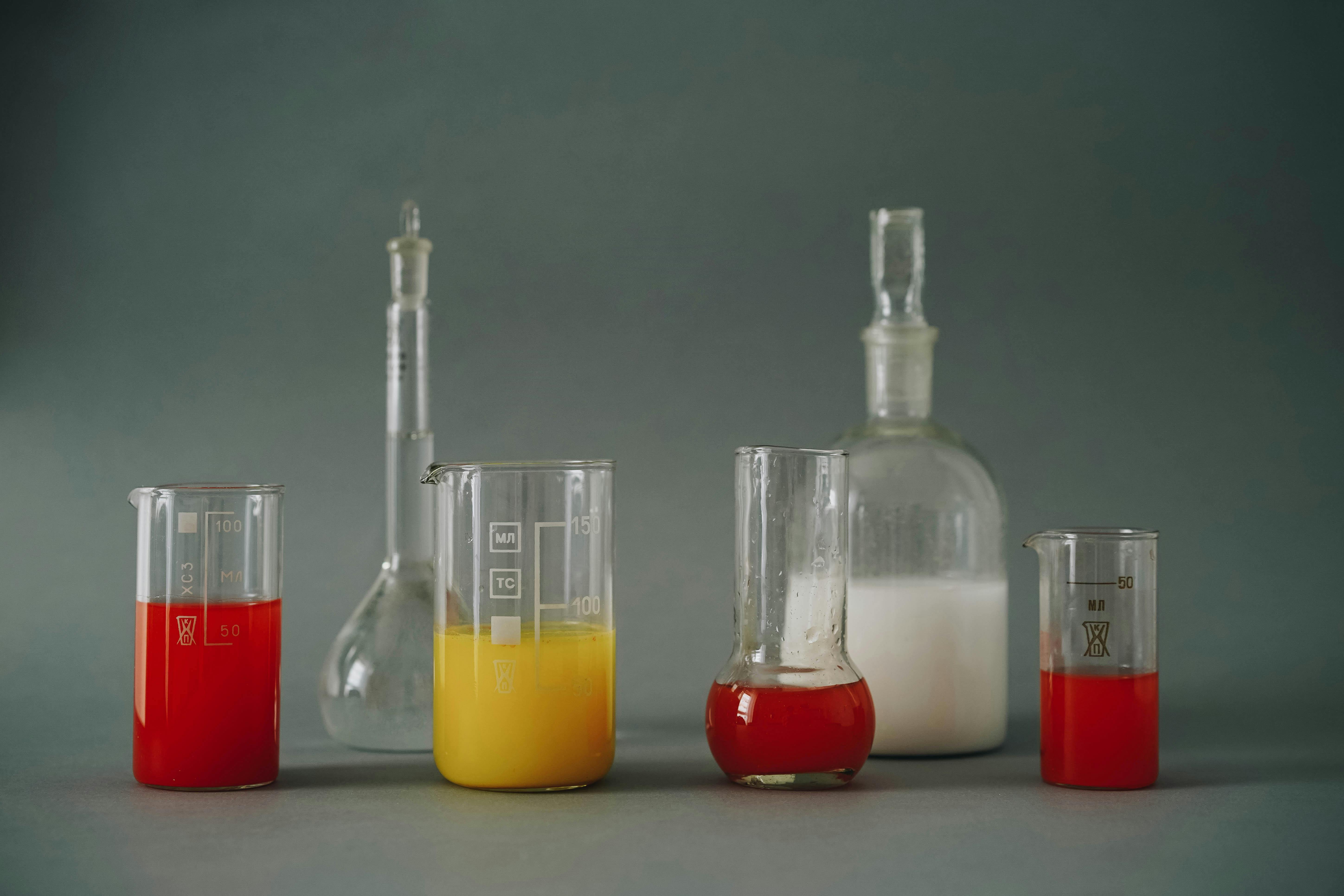 Clear Glass Bottle With Yellow Liquid · Free Stock Photo