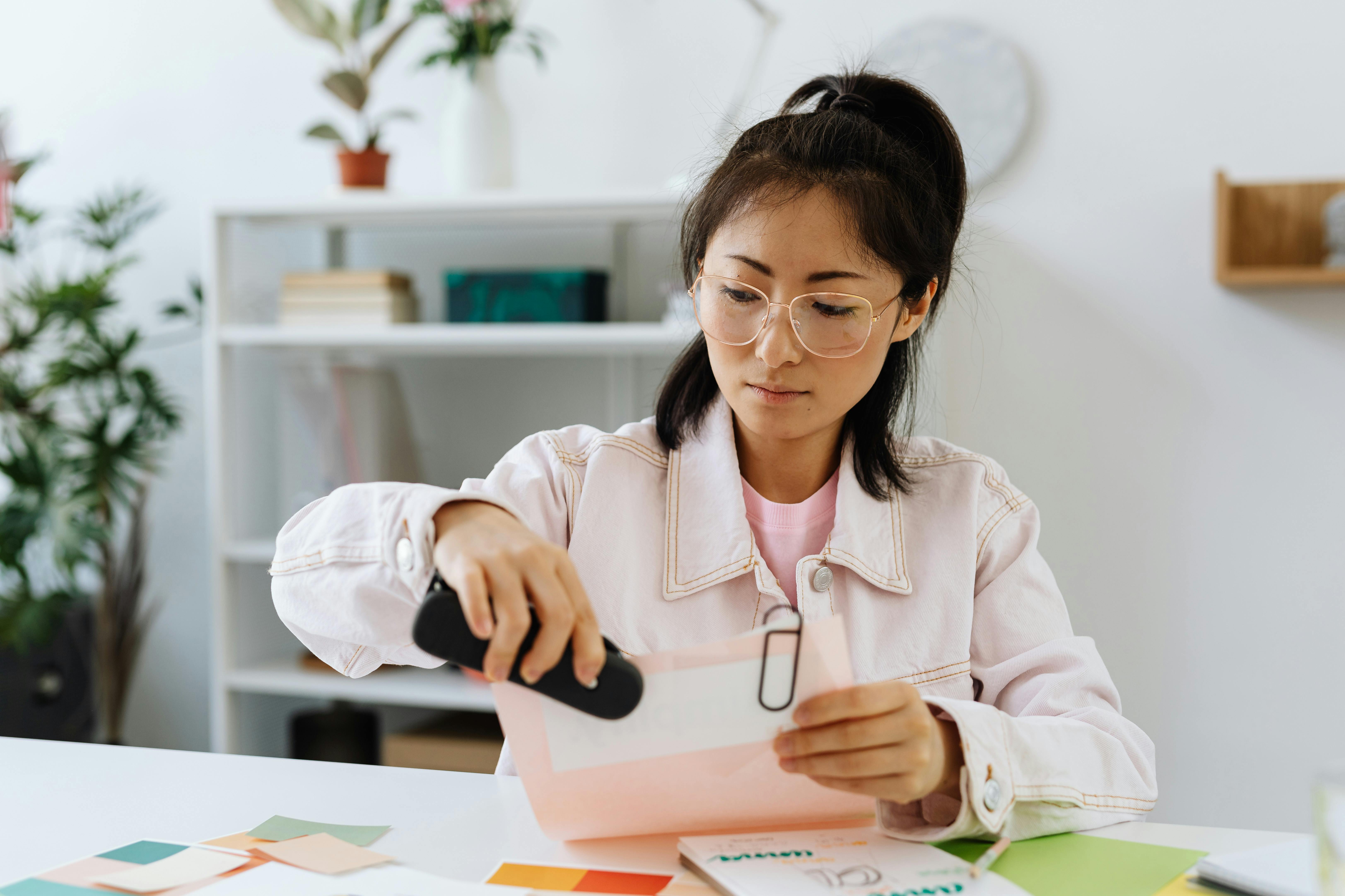 Photo of Woman Done on Her Paperwork · Free Stock Photo