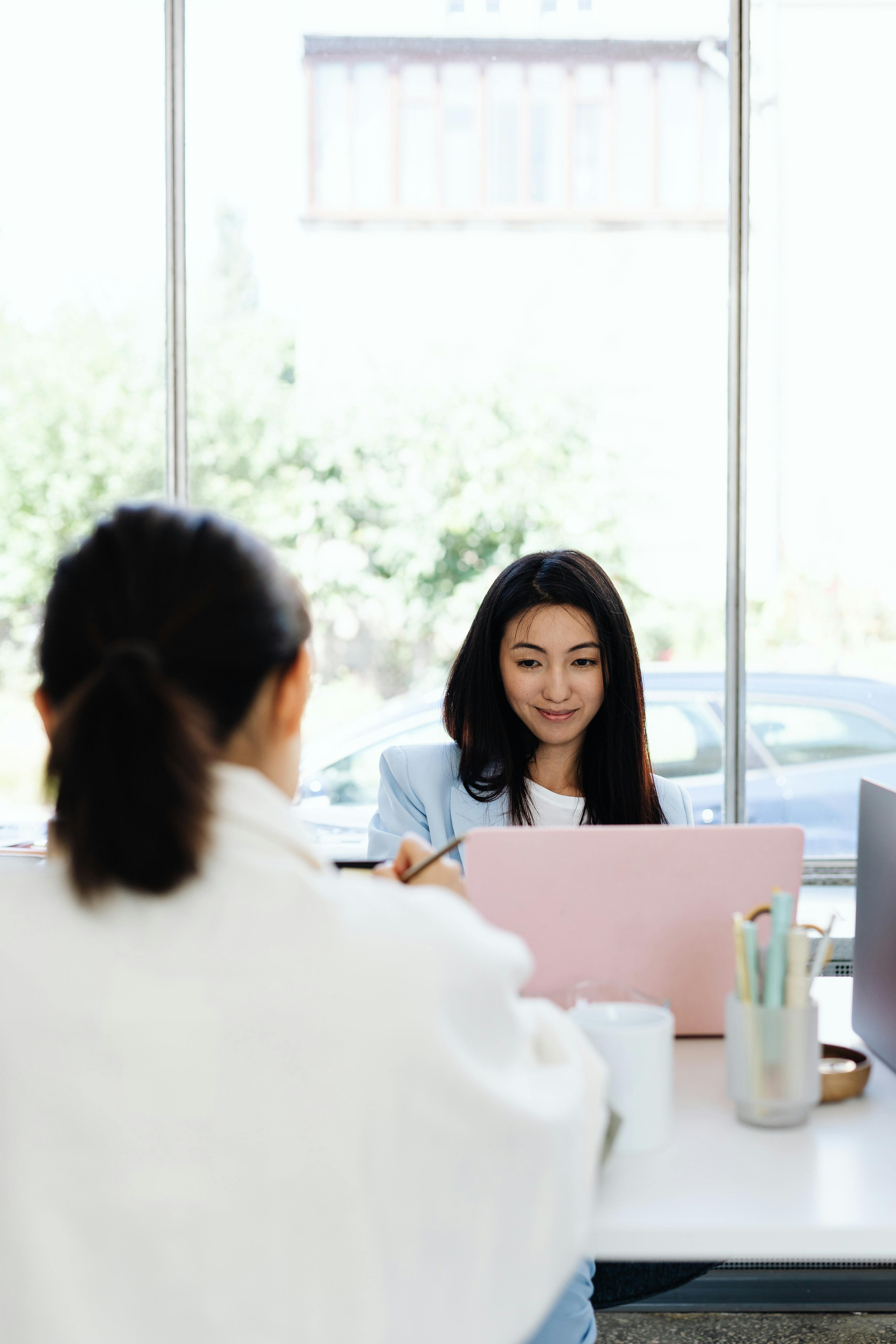 Women at Desk in Office · Free Stock Photo