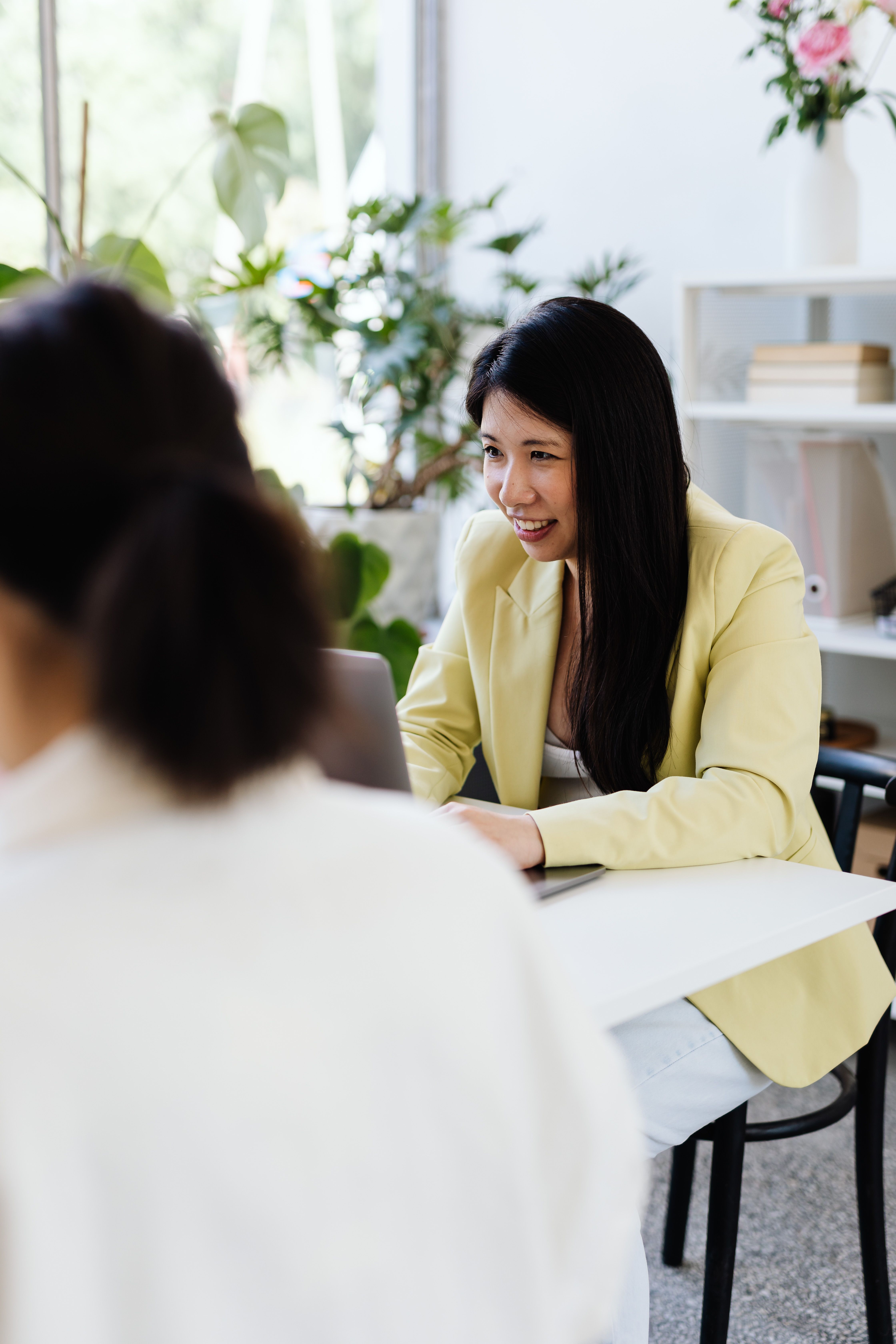 Smiling Woman at Work · Free Stock Photo