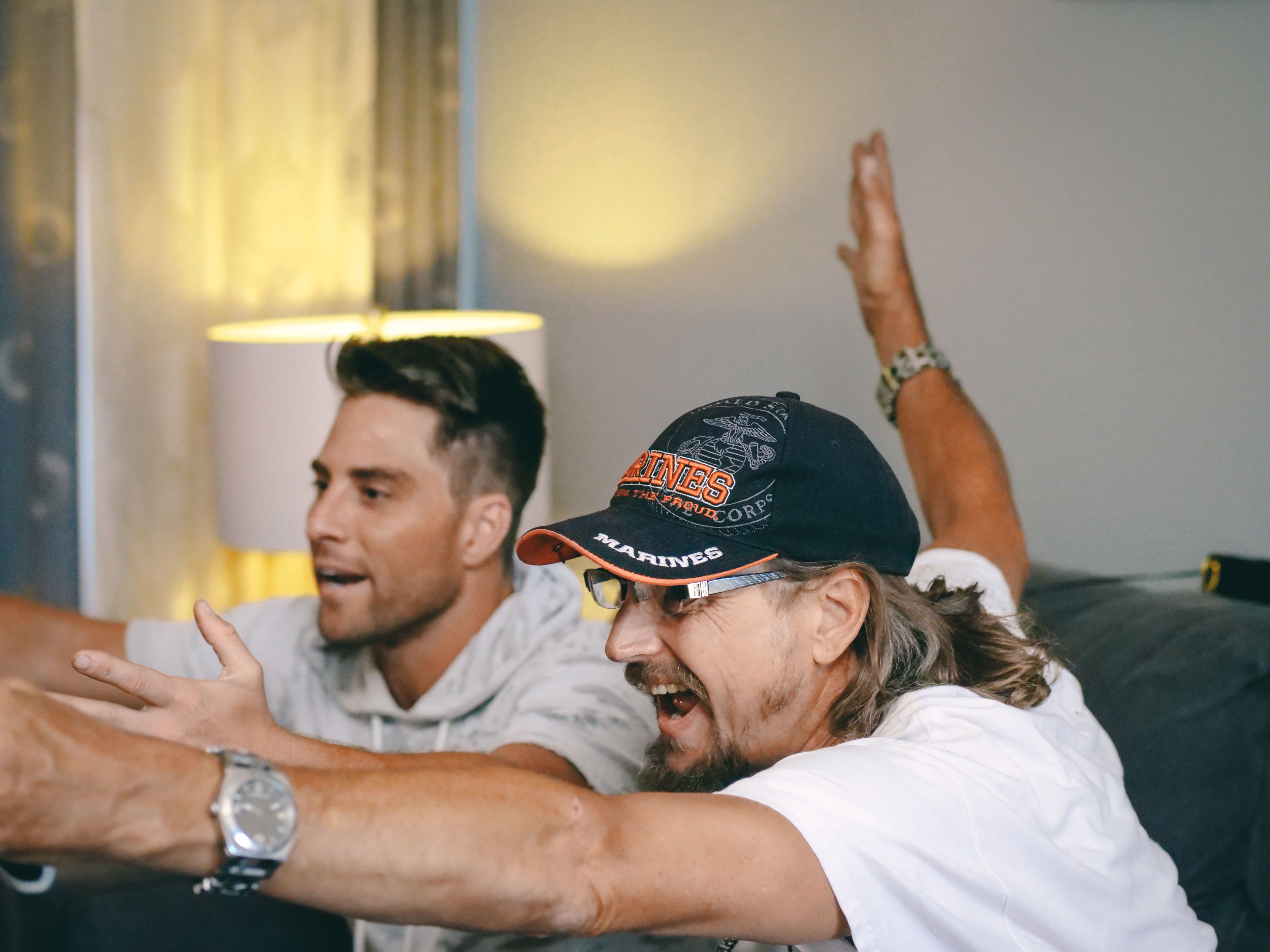 Happy Men with Their Arms Open Wide · Free Stock Photo